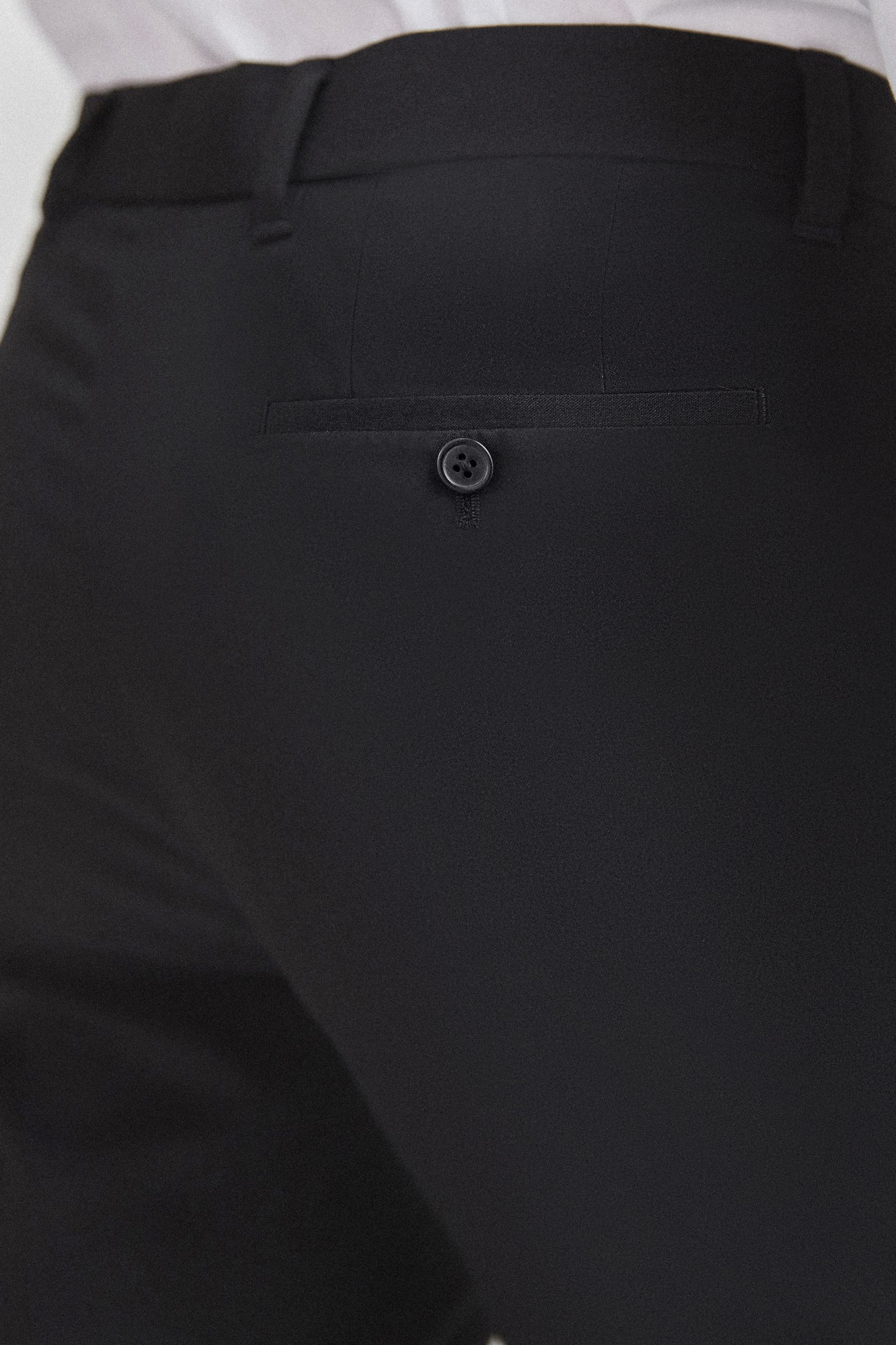 Buy Black Slim Tapered Stretch Smart Trousers from the Next UK online shop