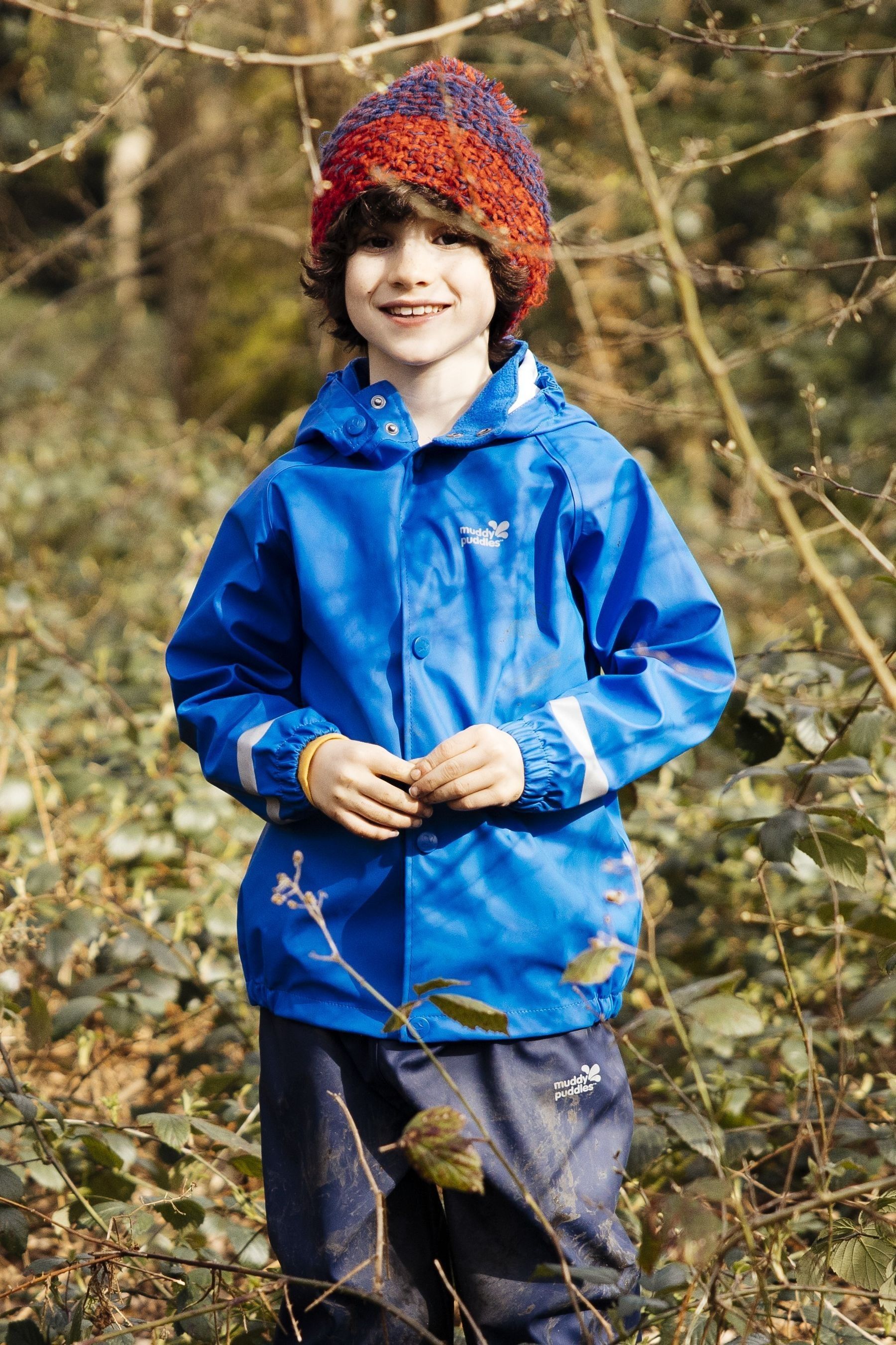Buy Muddy Puddles Recycled Rainy Day Waterproof Jacket from the Next UK ...