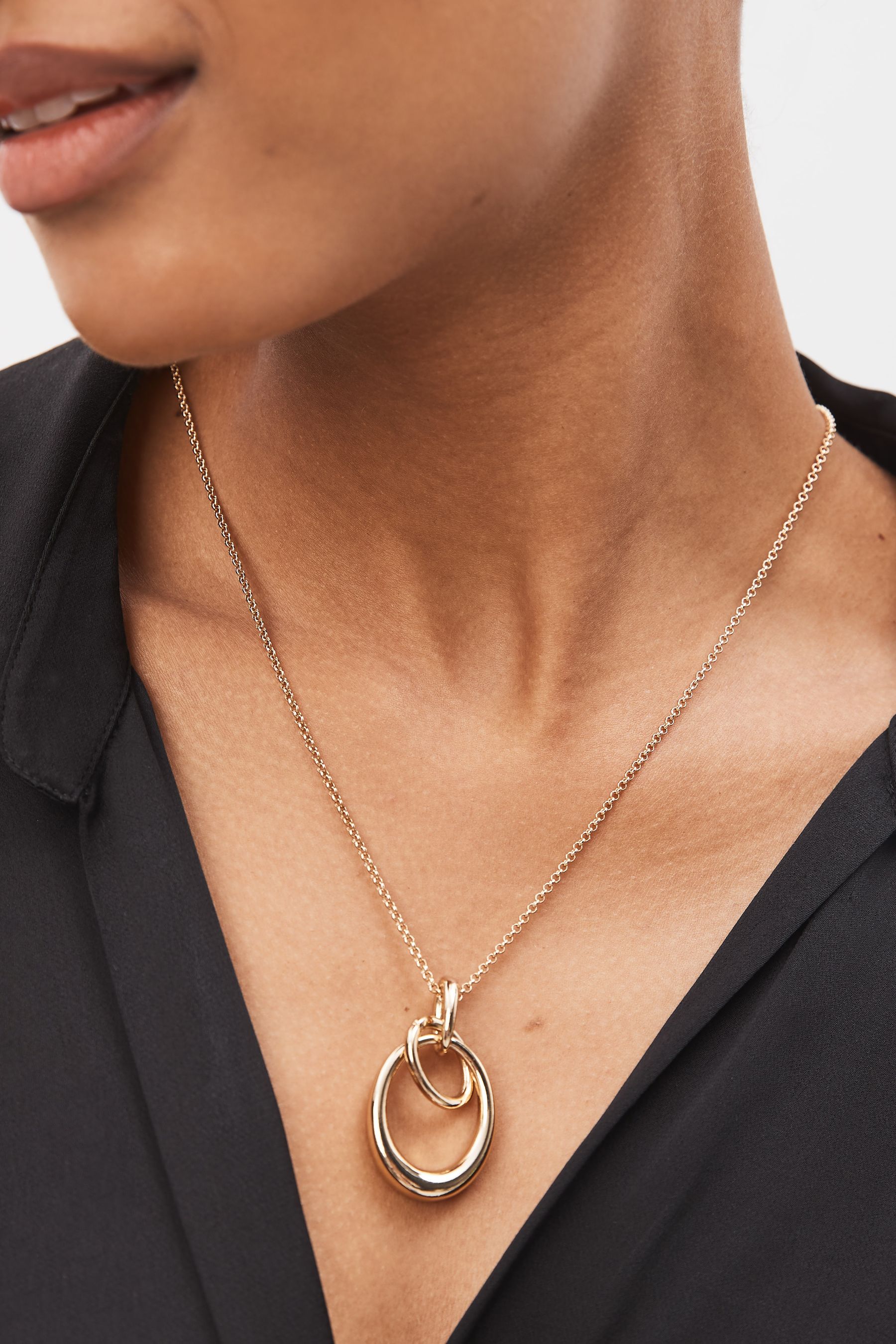 Buy Gold Tone Interlocking Circle Pendant Necklace from the Next UK ...