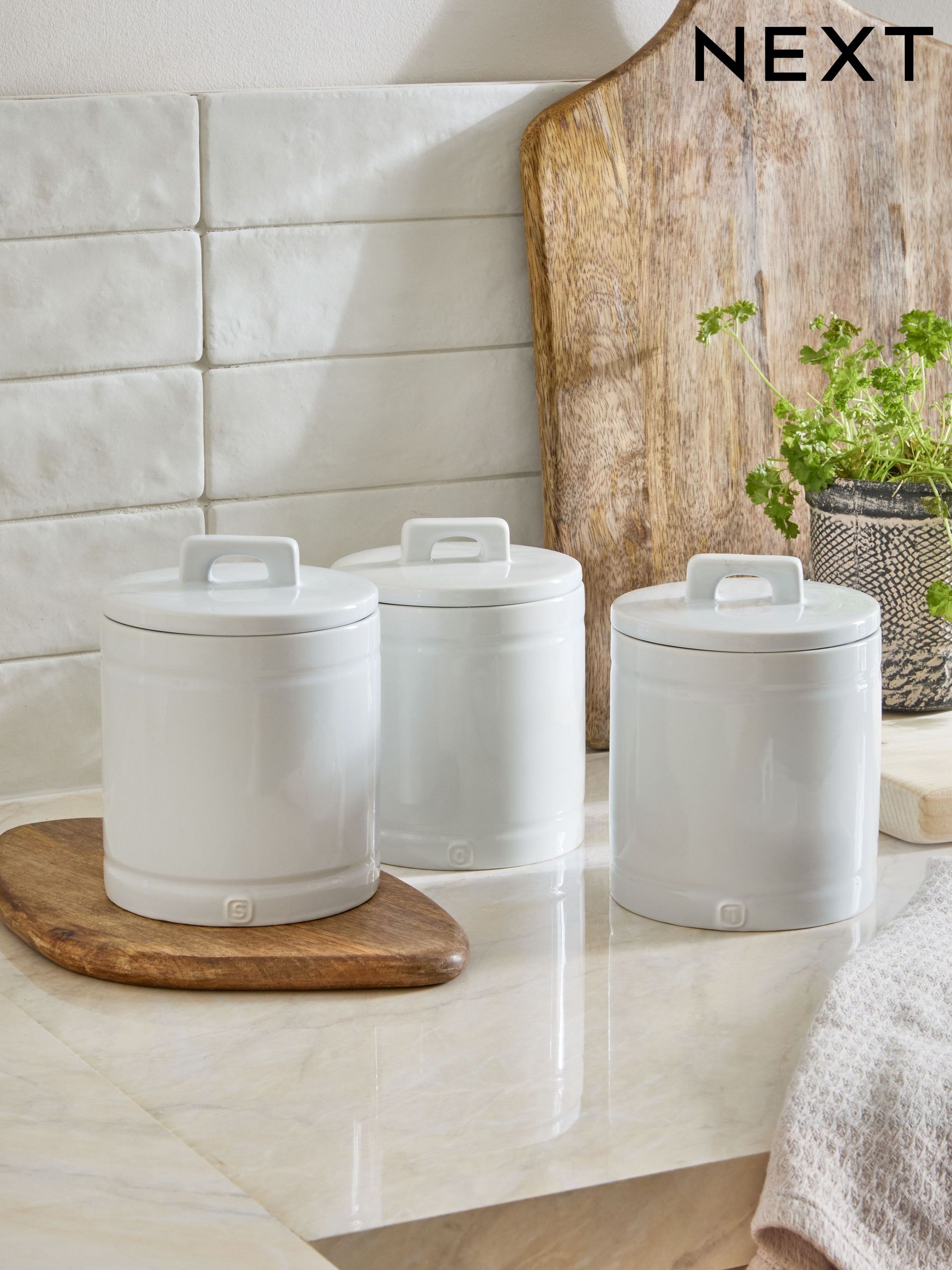 White ceramic canisters store