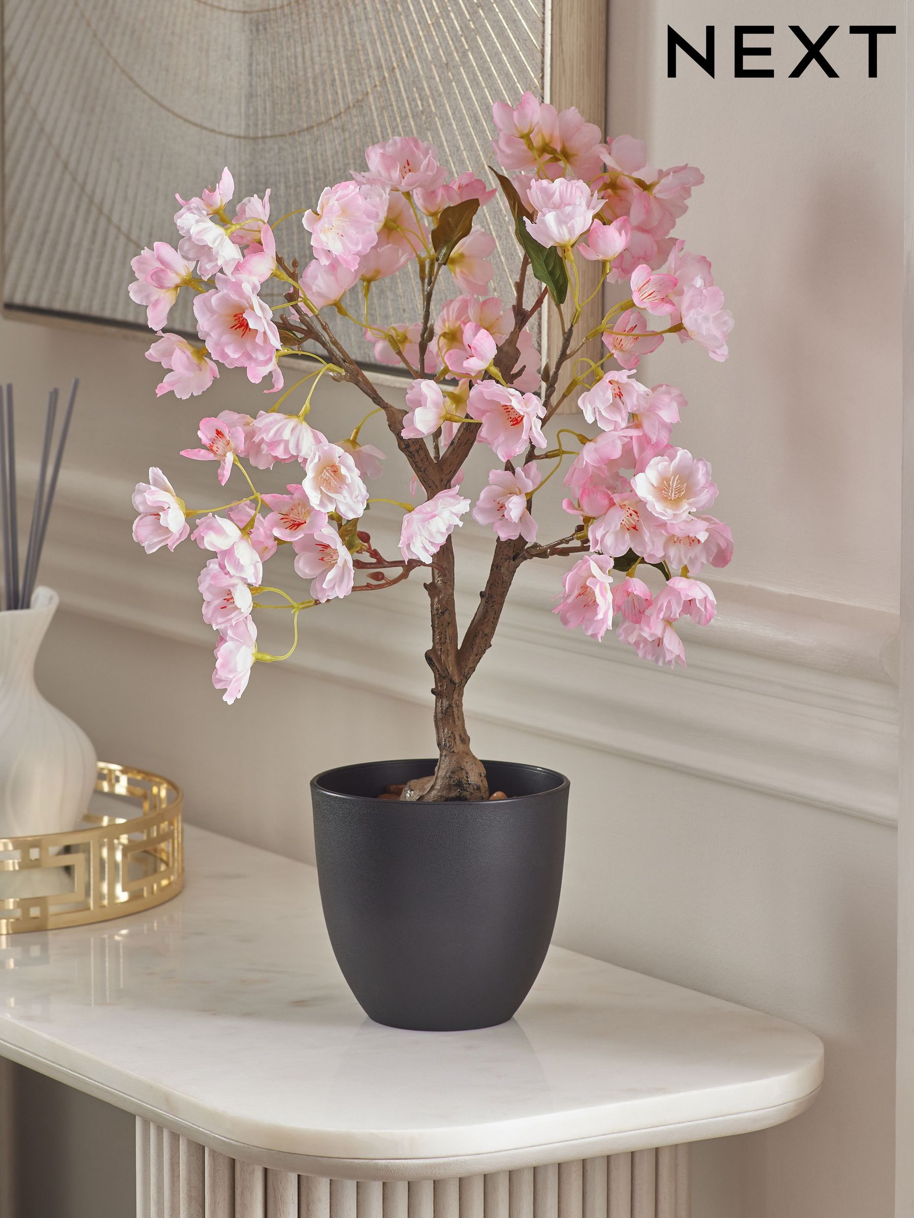 Next artificial flowers store
