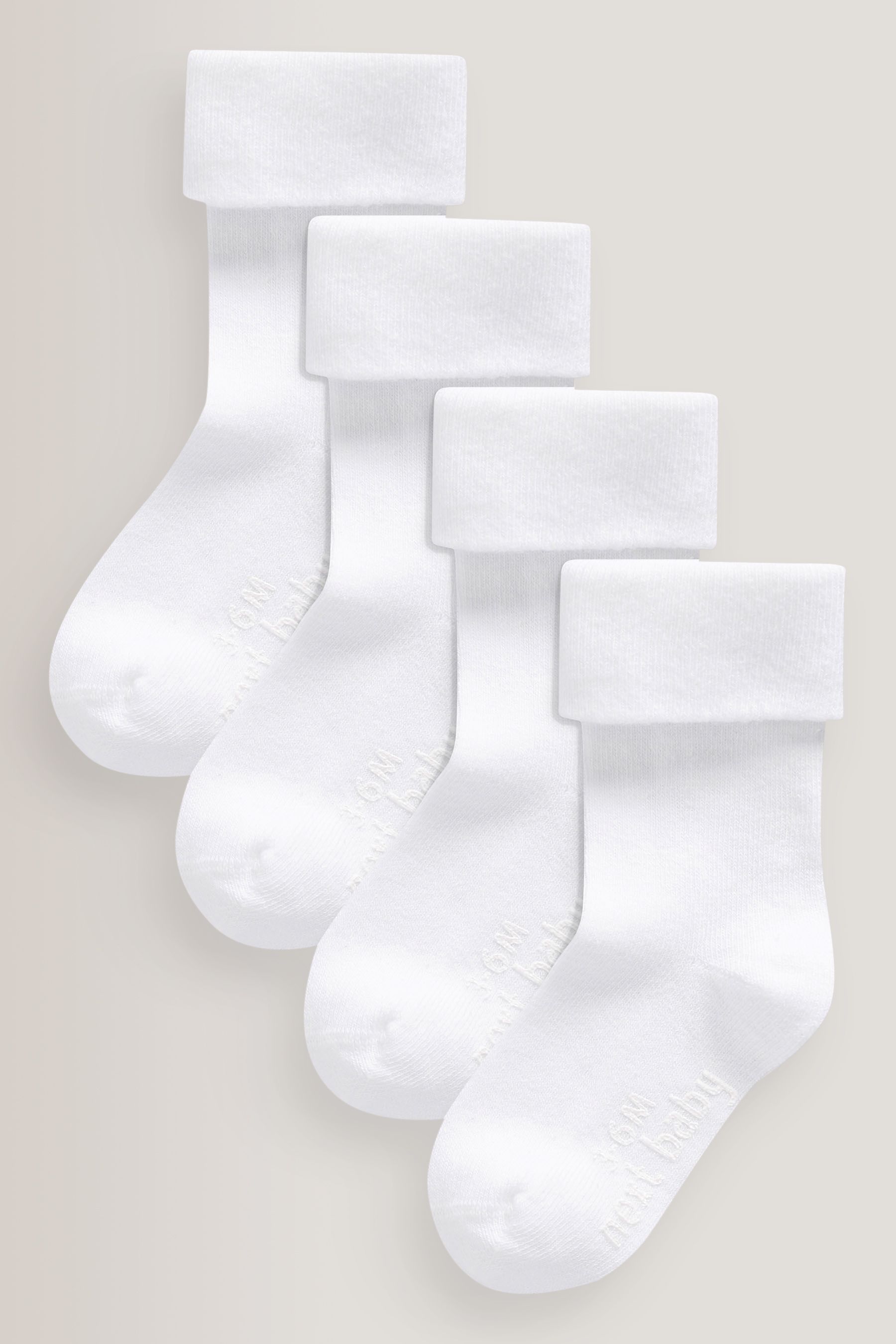 Buy White 4 Pack Baby Roll Top Socks (0mths-2yrs) from the Next UK ...