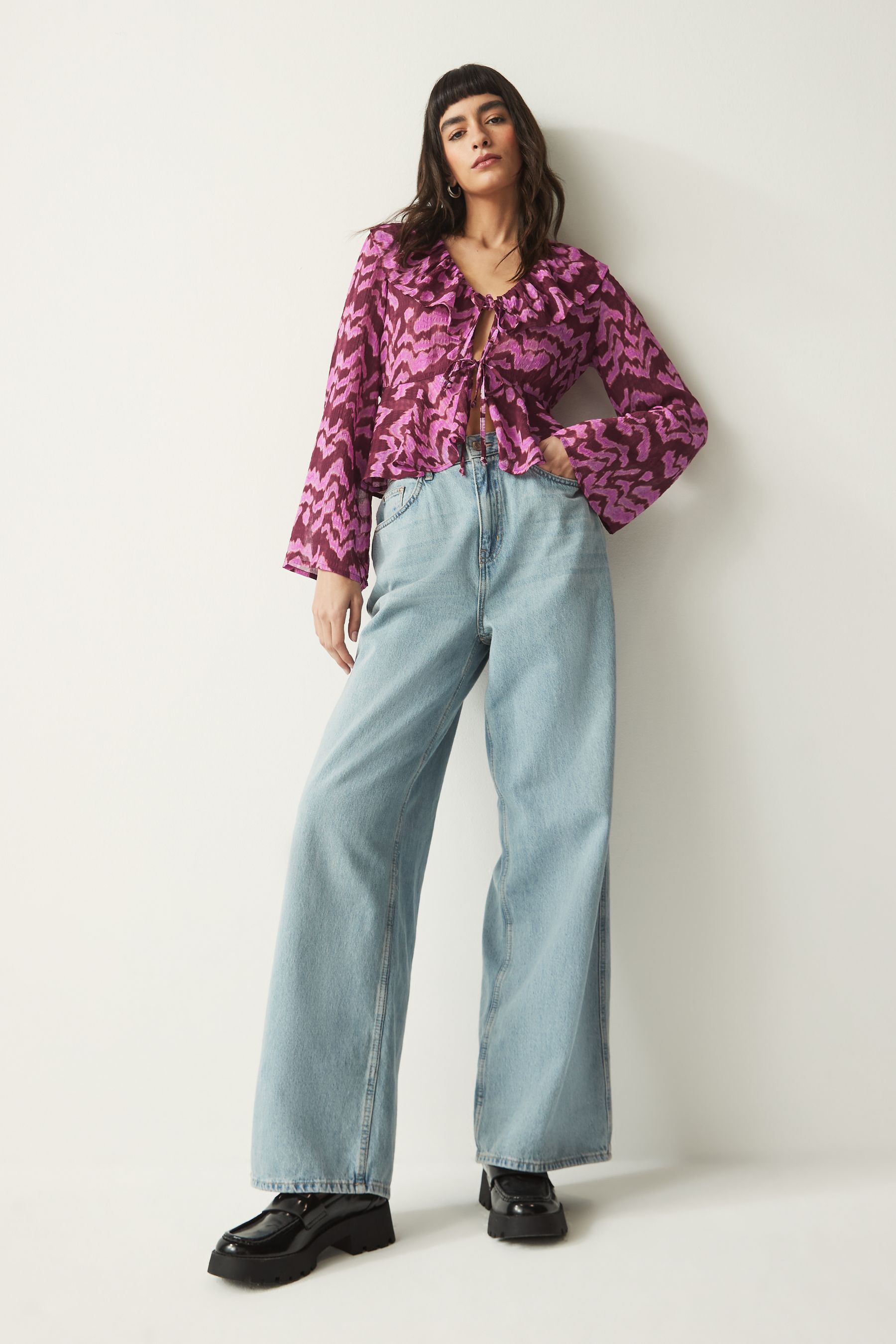 Buy Pink/Red Tie Front Ruffle Long Sleeve Blouse from Next Ireland