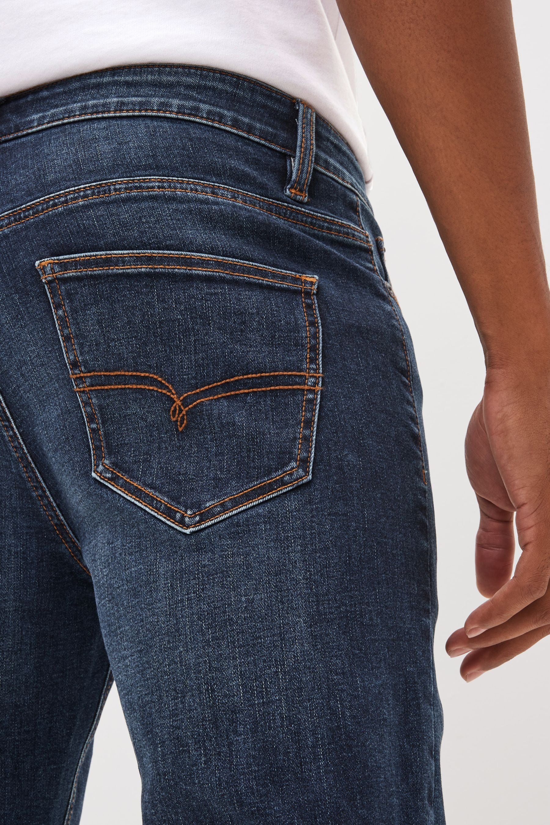 Buy Blue Straight Fit Motion Flex Jeans from the Next UK online shop