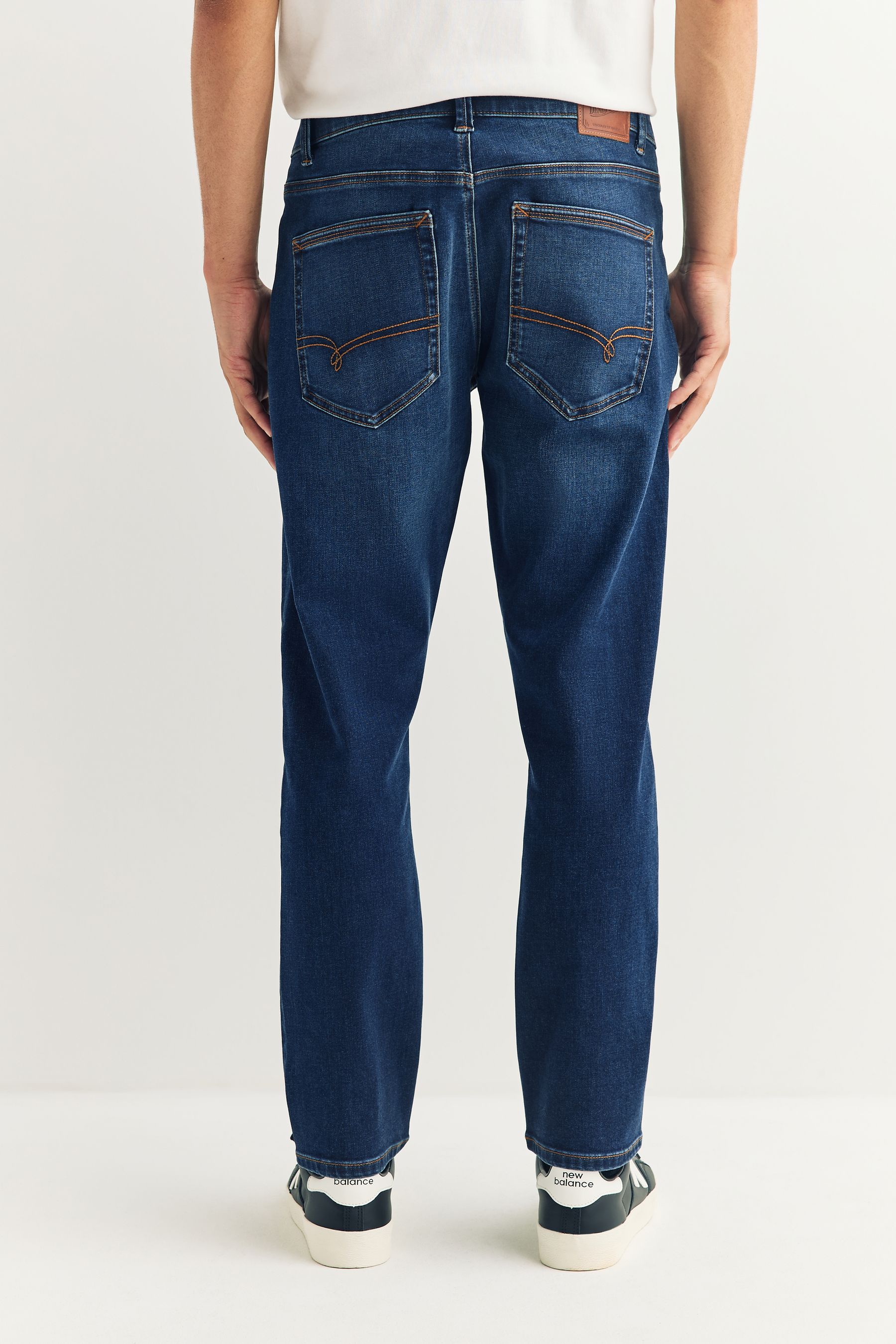 Buy Blue Slim Fit Motion Flex Jeans from the Next UK online shop