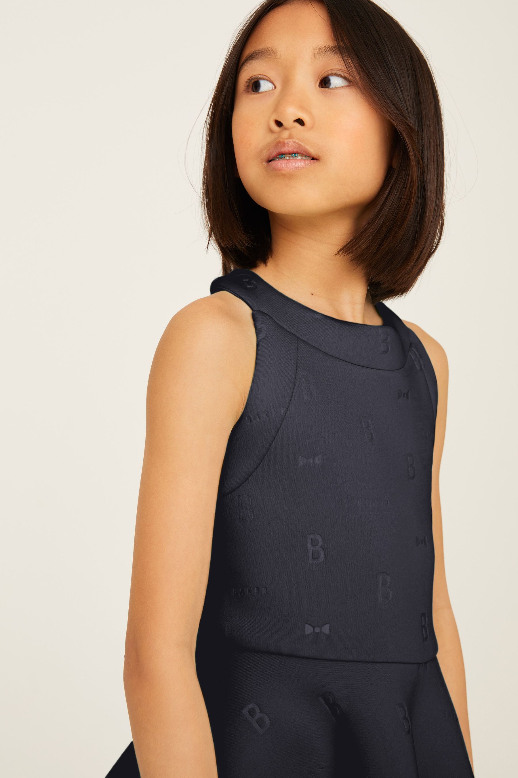 Buy Baker by Ted Baker Halter Neck Embossed Scuba Dress from Next Bahrain