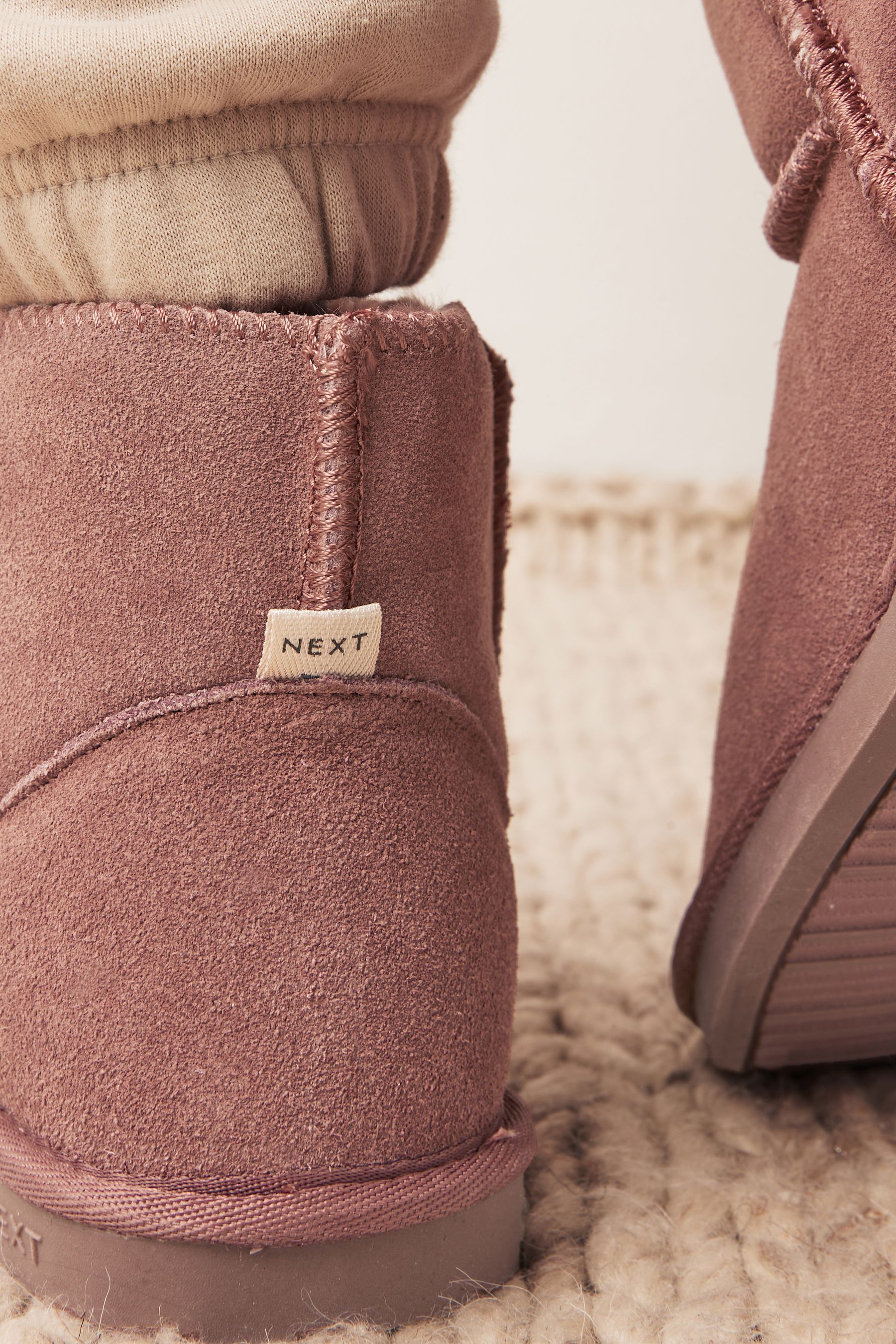Buy Mink Pink Faux Fur Lined Suede Slipper Boots from the Next UK ...