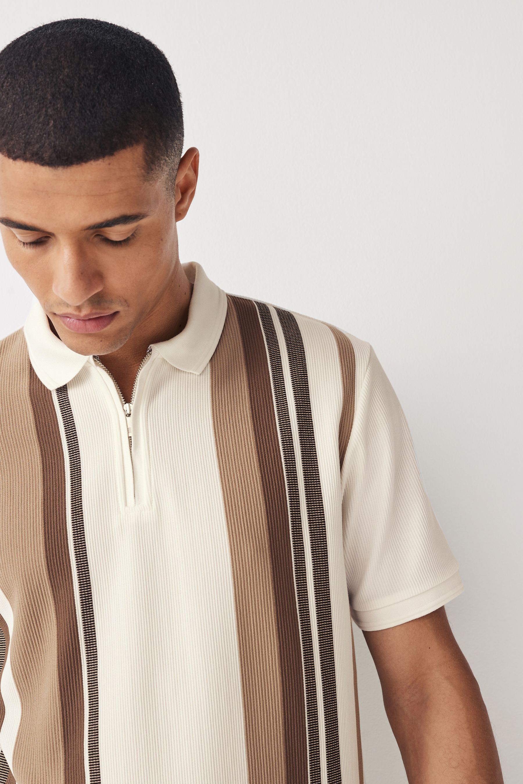 Buy Neutral/White Vertical stripe Polo Shirt from Next United Arab Emirates