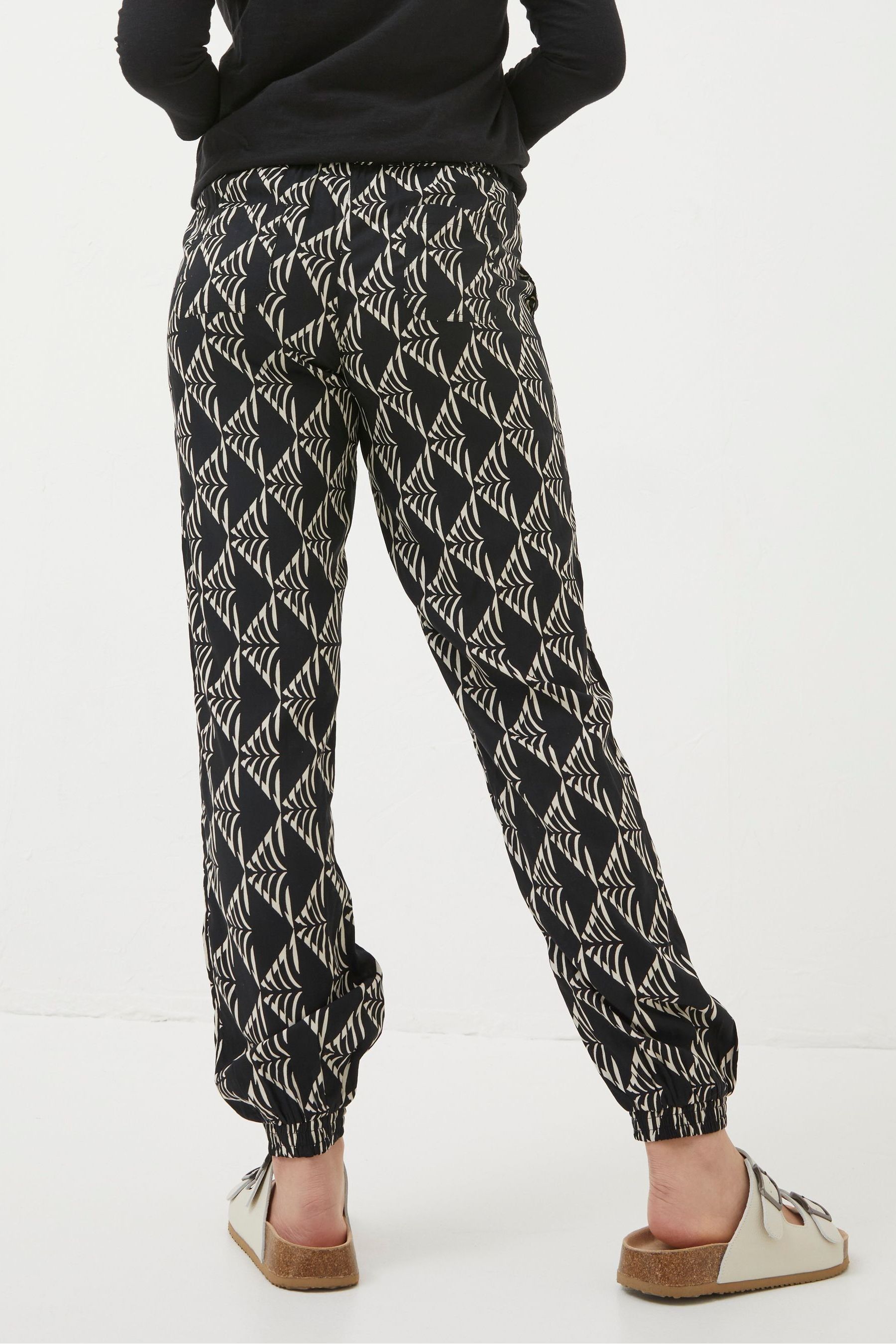 Buy FatFace Black Lyme Mono Geo Trousers from the Next UK online shop