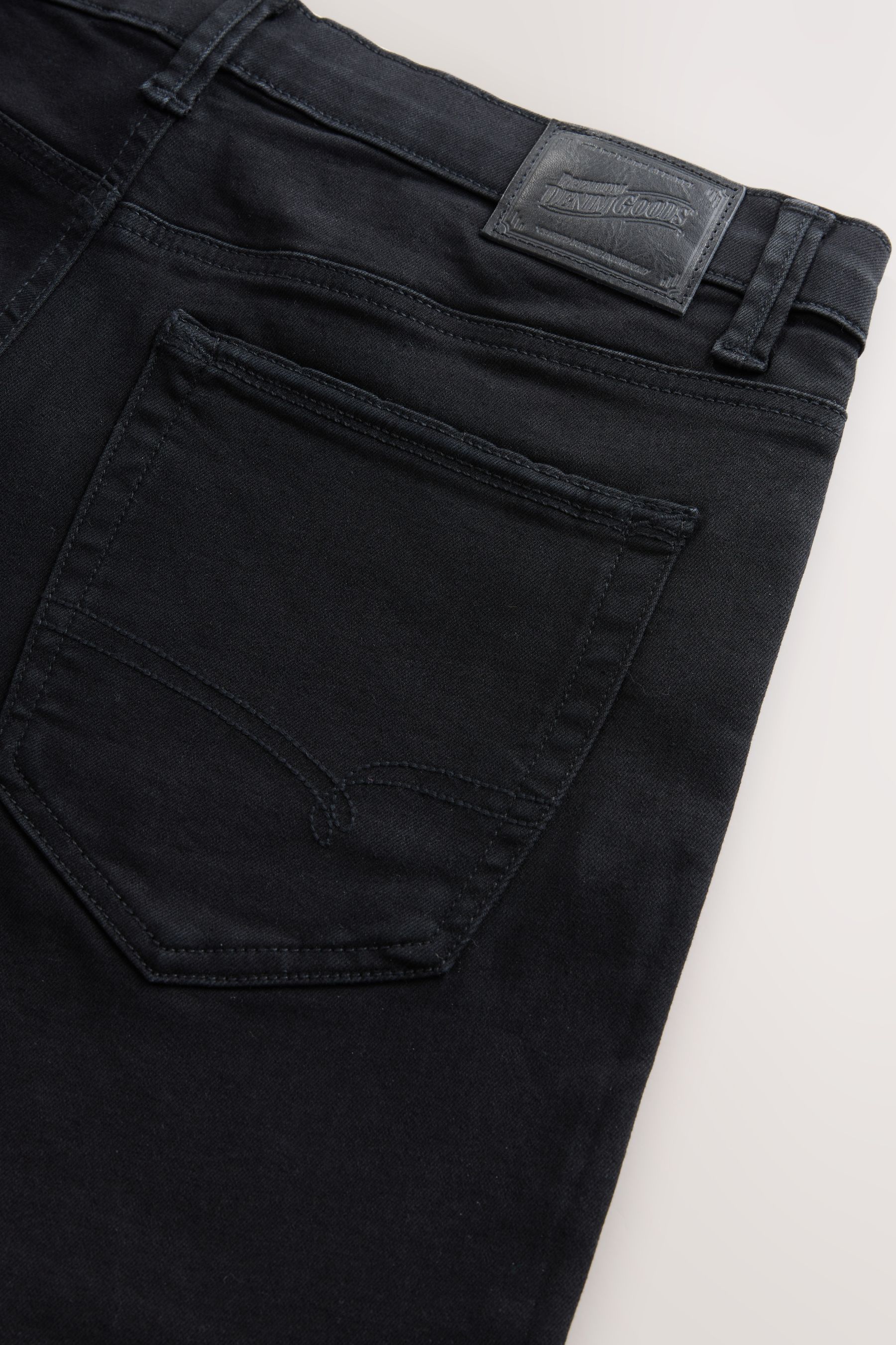 Buy Black Straight Fit Motion Flex Jeans from the Next UK online shop