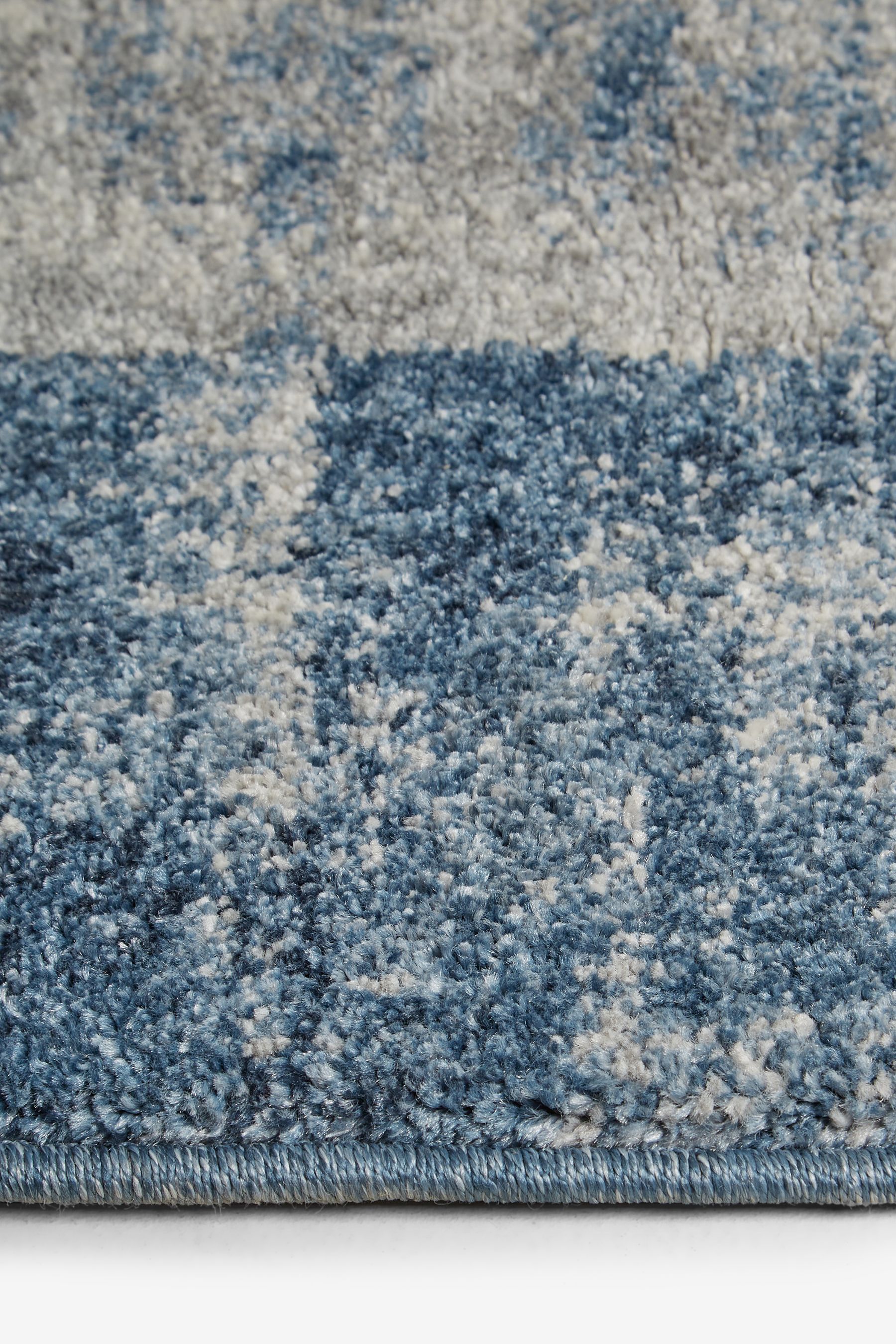 Buy Navy Blue Textured Border Rug from the Next UK online shop