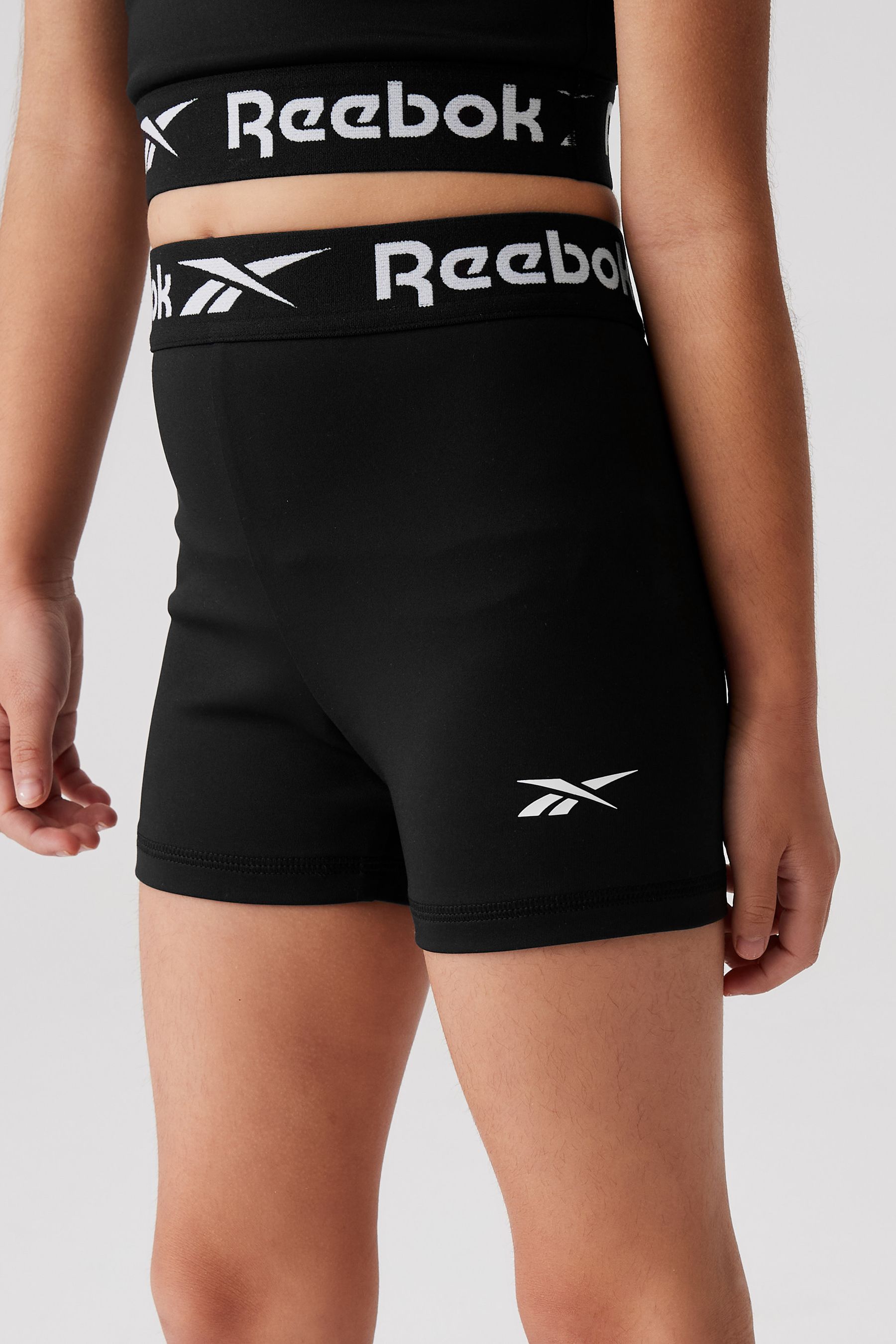 Buy Reebok Black Logo Tape Shorts from the Next UK online shop