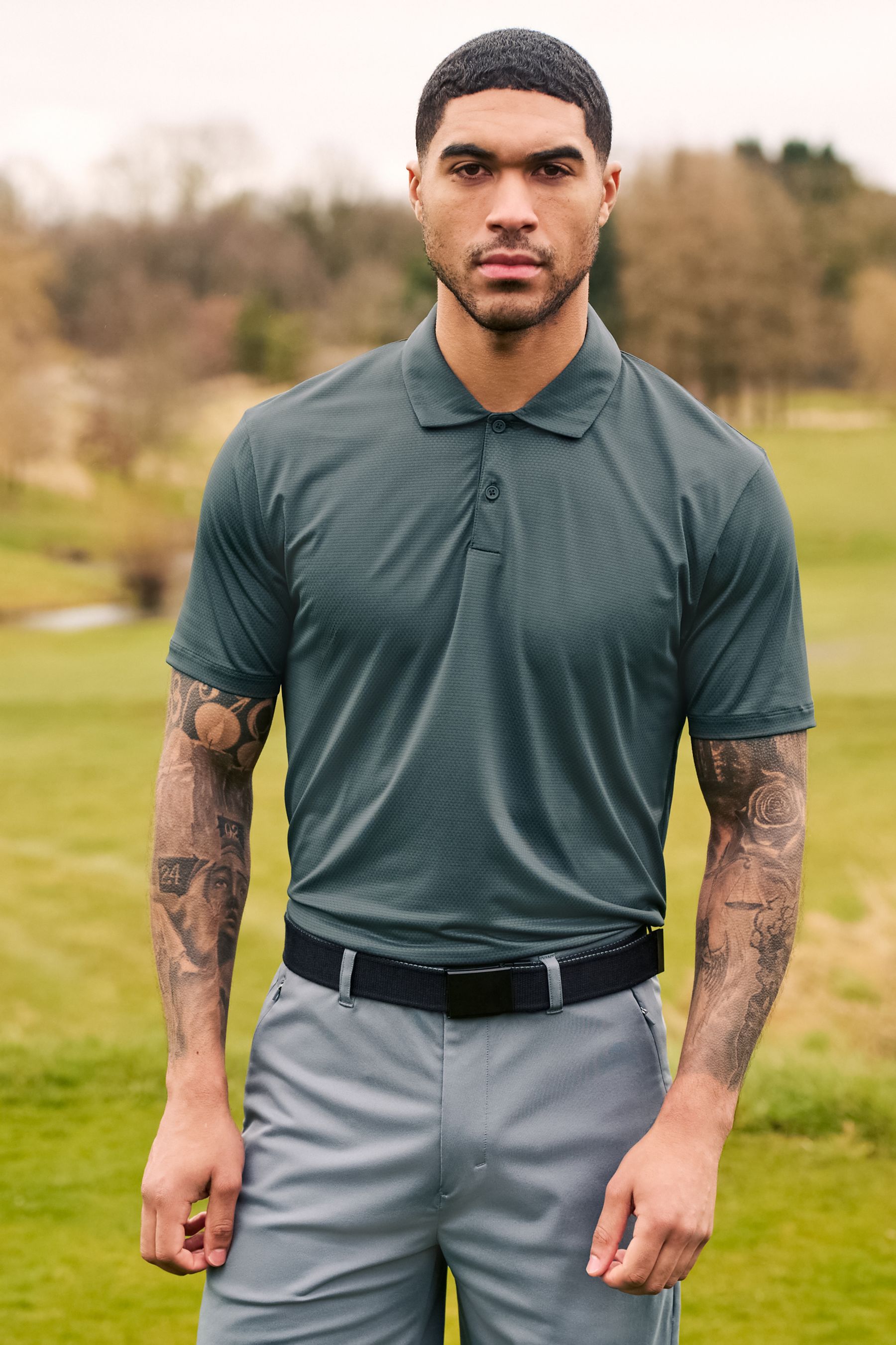 Buy Slate Grey Textured Golf Polo Shirt from the Next UK online shop