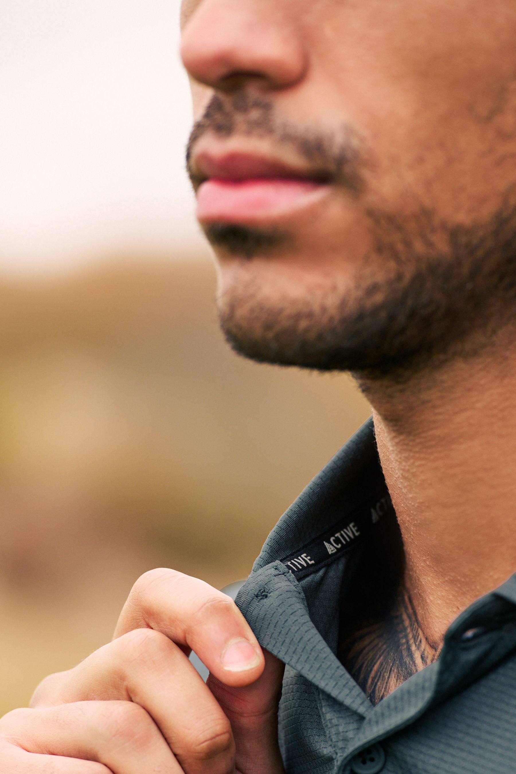 Buy Slate Grey Textured Golf Polo Shirt from the Next UK online shop