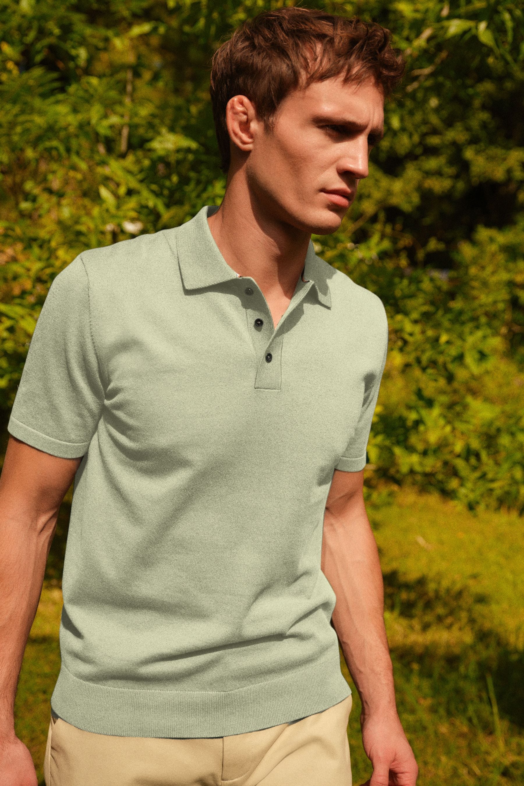 Buy Green Regular Fit Knitted Polo Shirt from the Next UK online shop