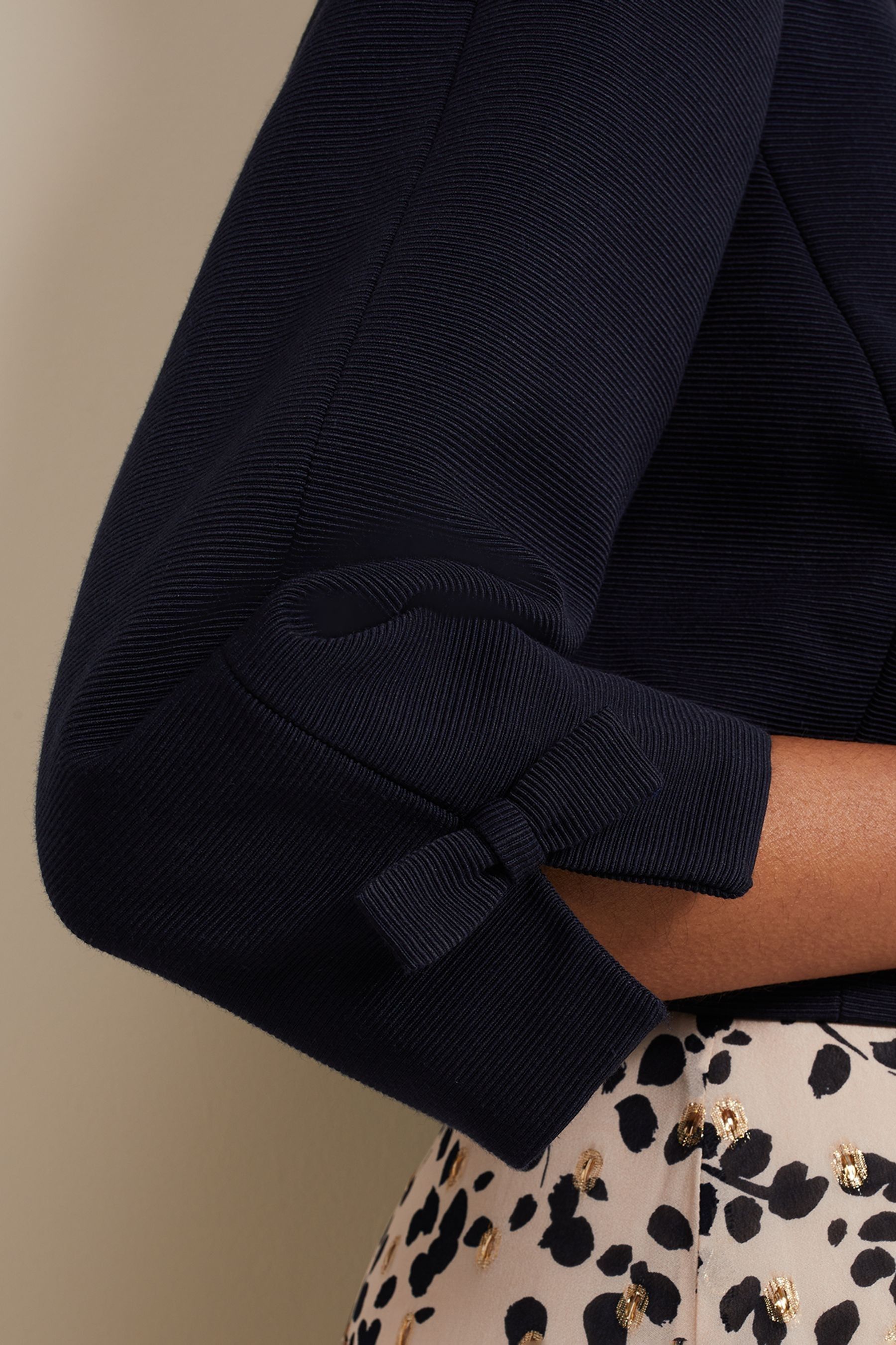 Buy Phase Eight Blue Petite Zoelle Bow Jacket from the Next UK online shop