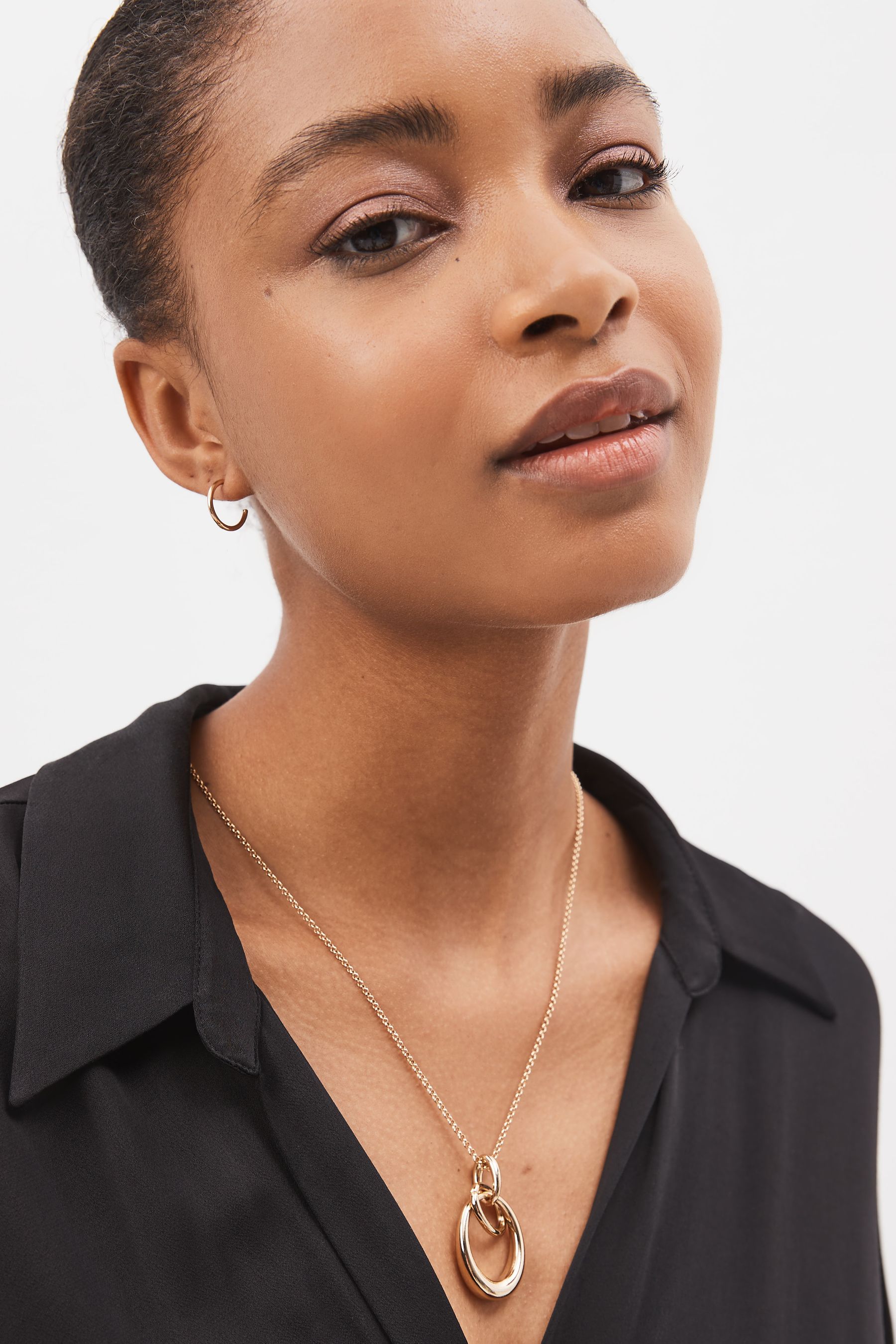 Buy Gold Tone Interlocking Circle Pendant Necklace from the Next UK ...