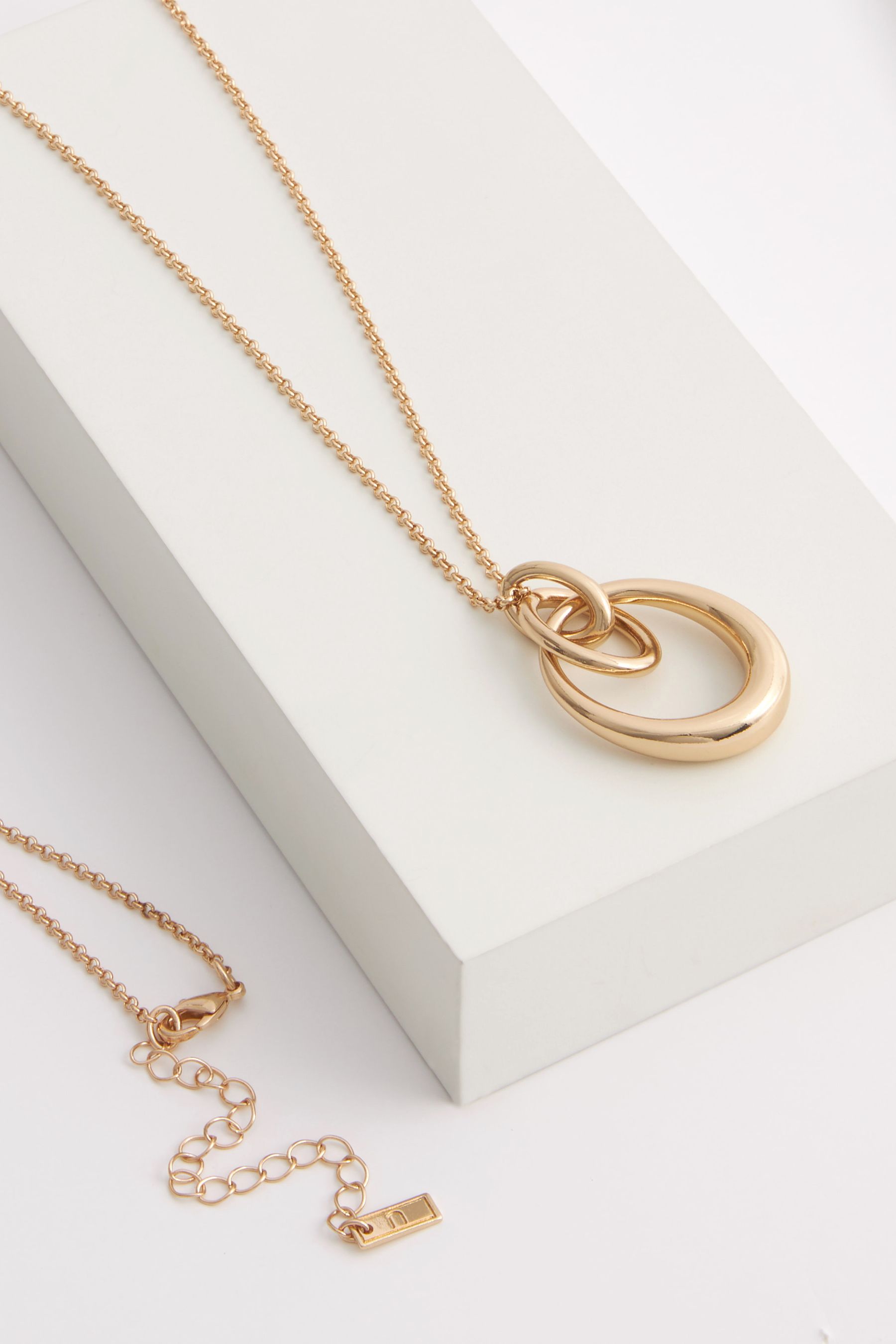 Buy Gold Tone Interlocking Circle Pendant Necklace from the Next UK ...