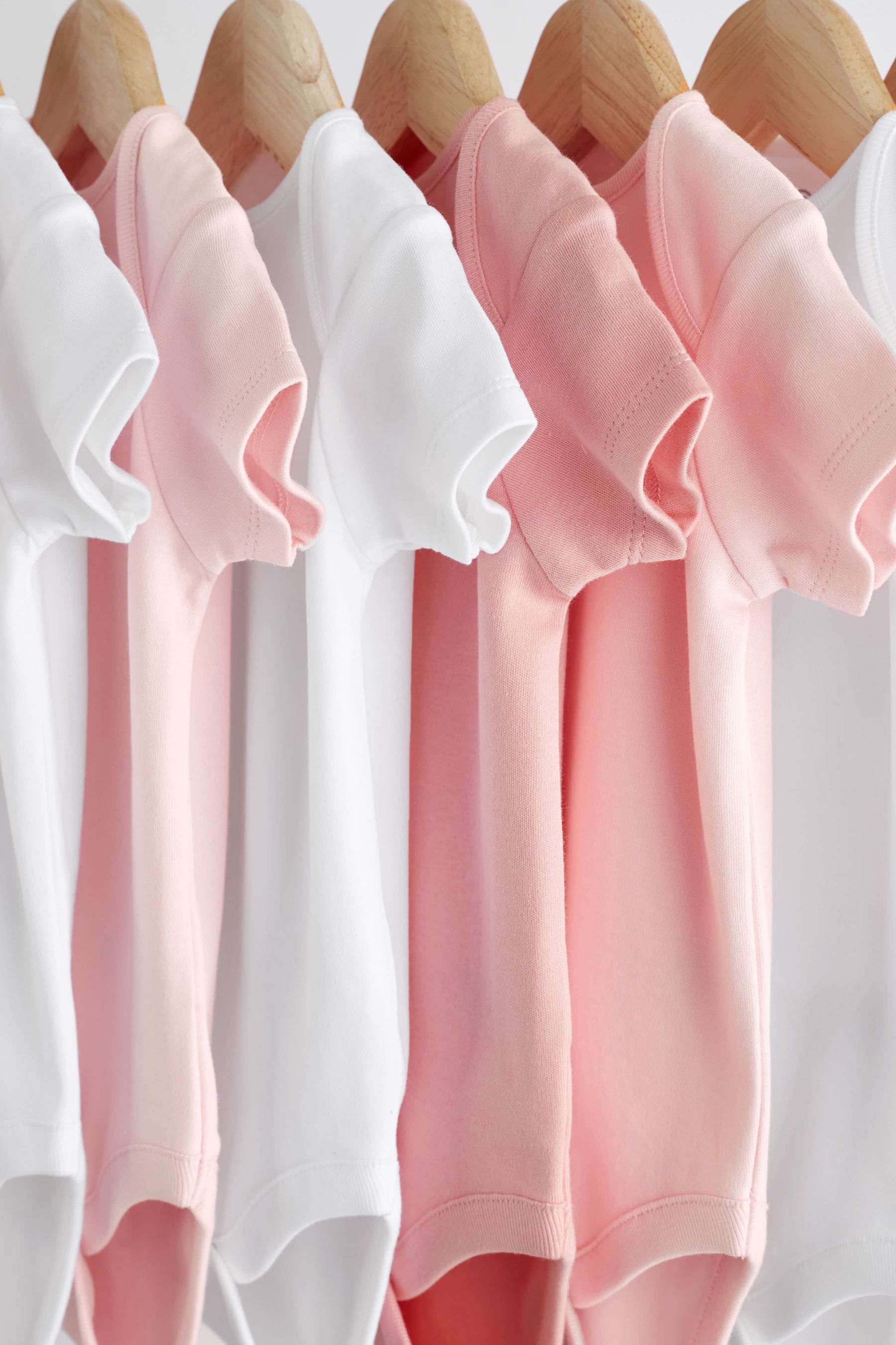 Buy Pink/White 10 Pack Short Sleeve Baby Bodysuits from the Next UK ...