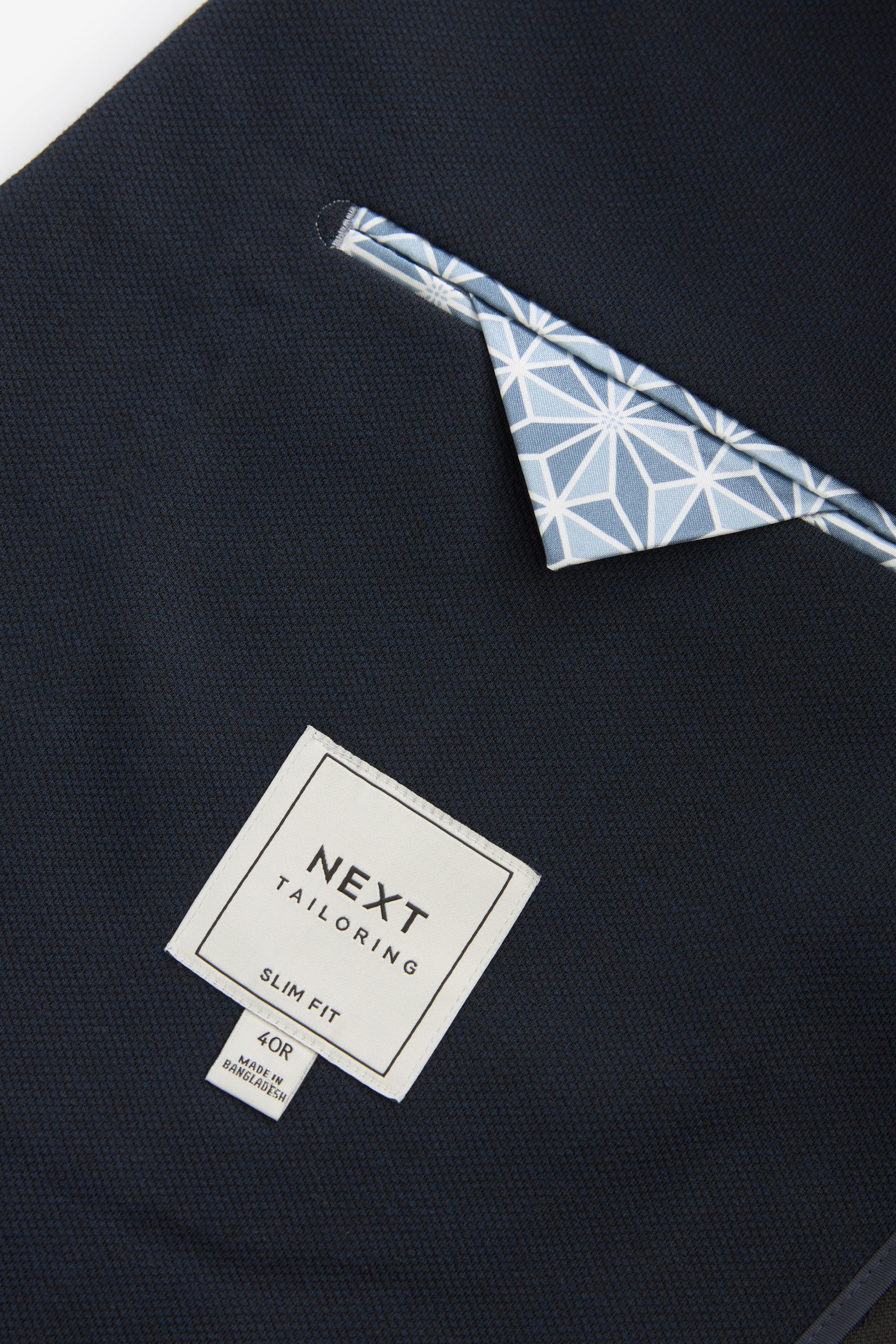 Buy Navy Blue Slim Fit Motionflex Stretch Jersey Blazer from Next ...