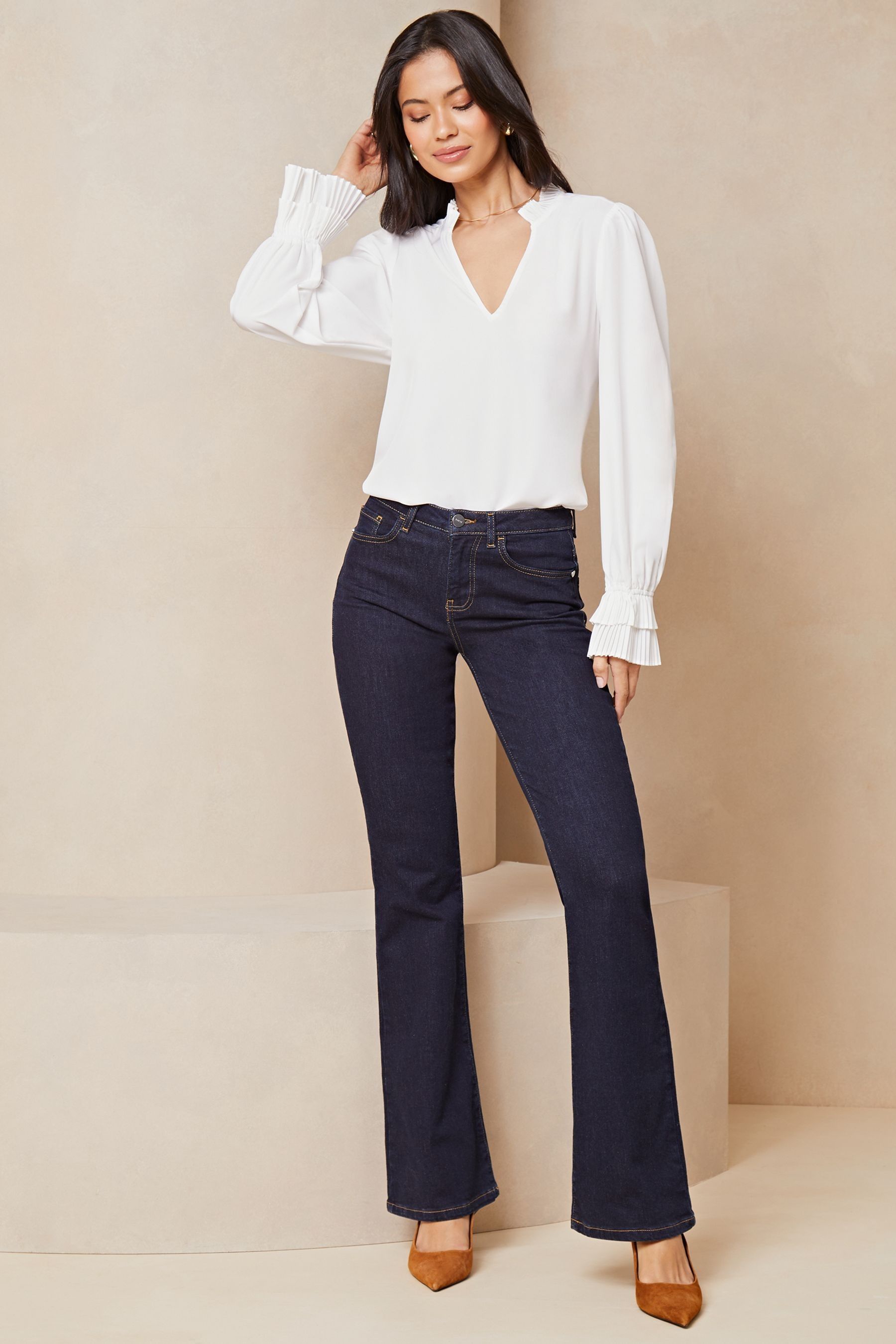 Buy Lipsy White Frill Ruffle V Neck Long Sleeve Blouse from Next Saudi ...