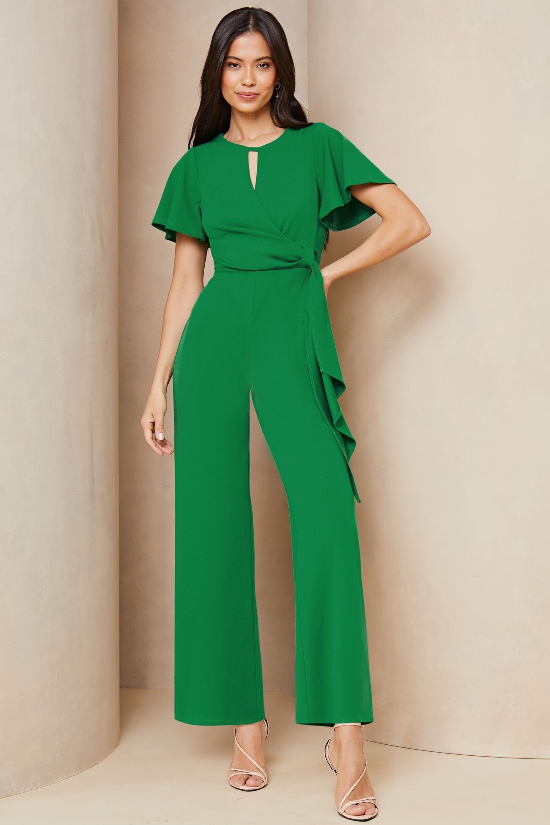 Buy Lipsy Green Petite Flutter Sleeve Tie Side Wide Leg Jumpsuit from ...