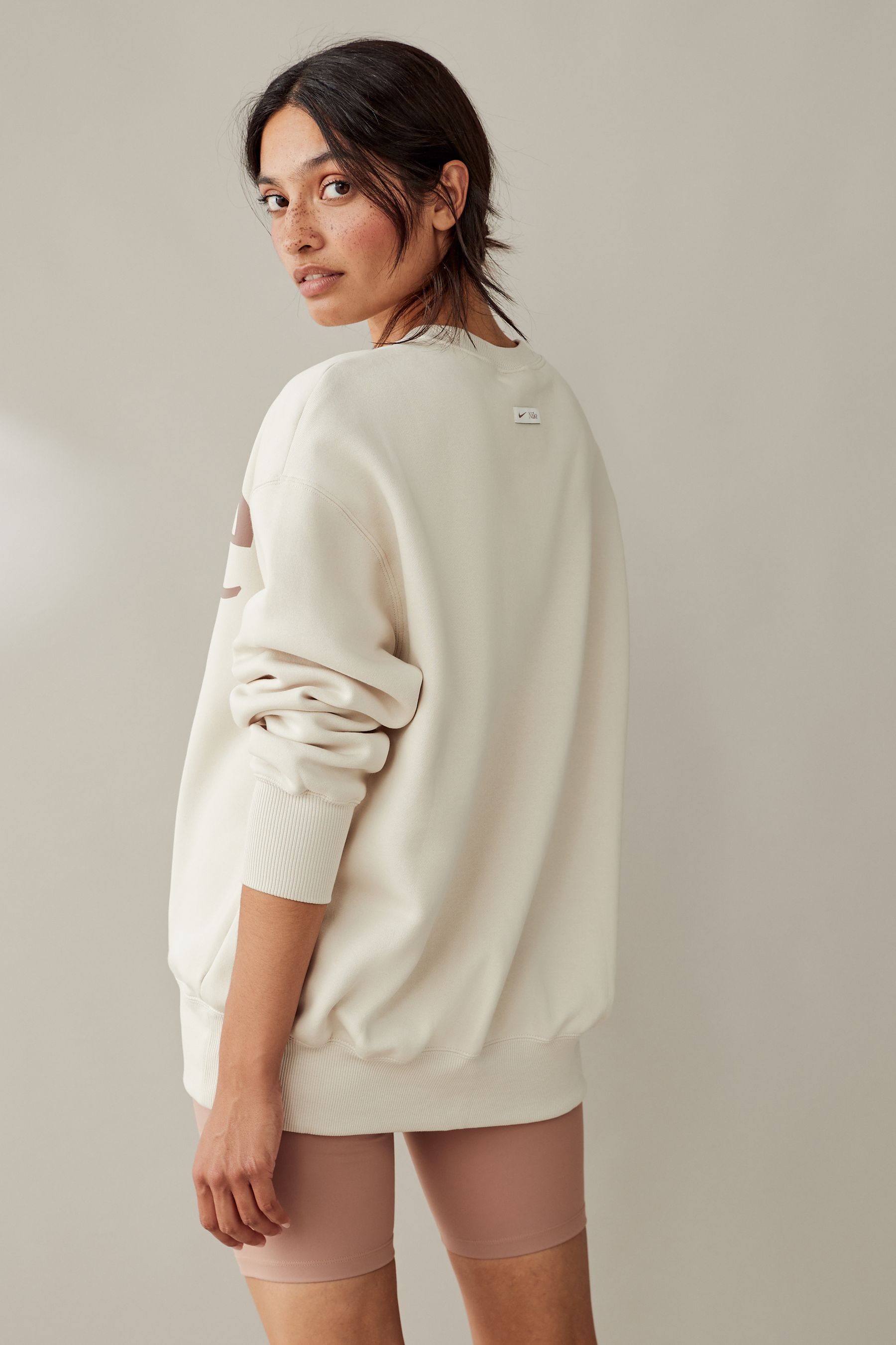 Buy Nike Cream Oversized Varsity Crew Neck Sweatshirt from the Next UK online shop