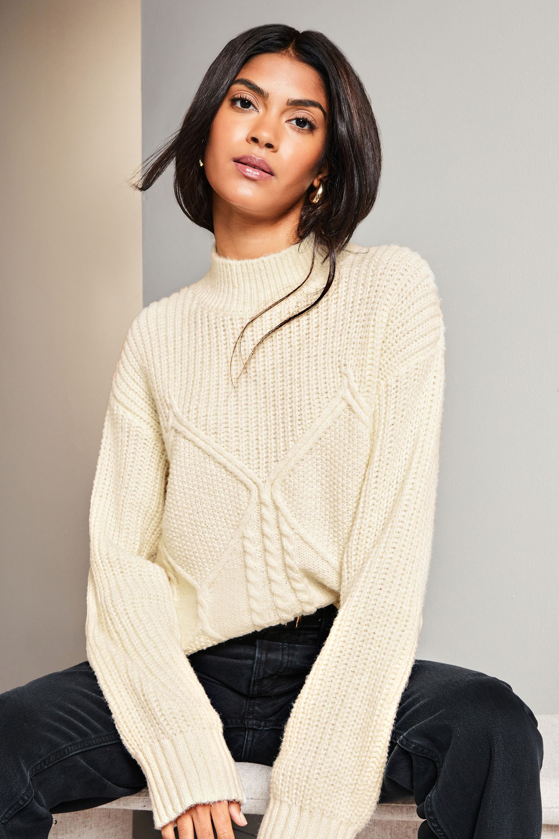 Buy Lipsy Ivory White Cosy High Neck Rib Cable Knitted Jumper from Next ...