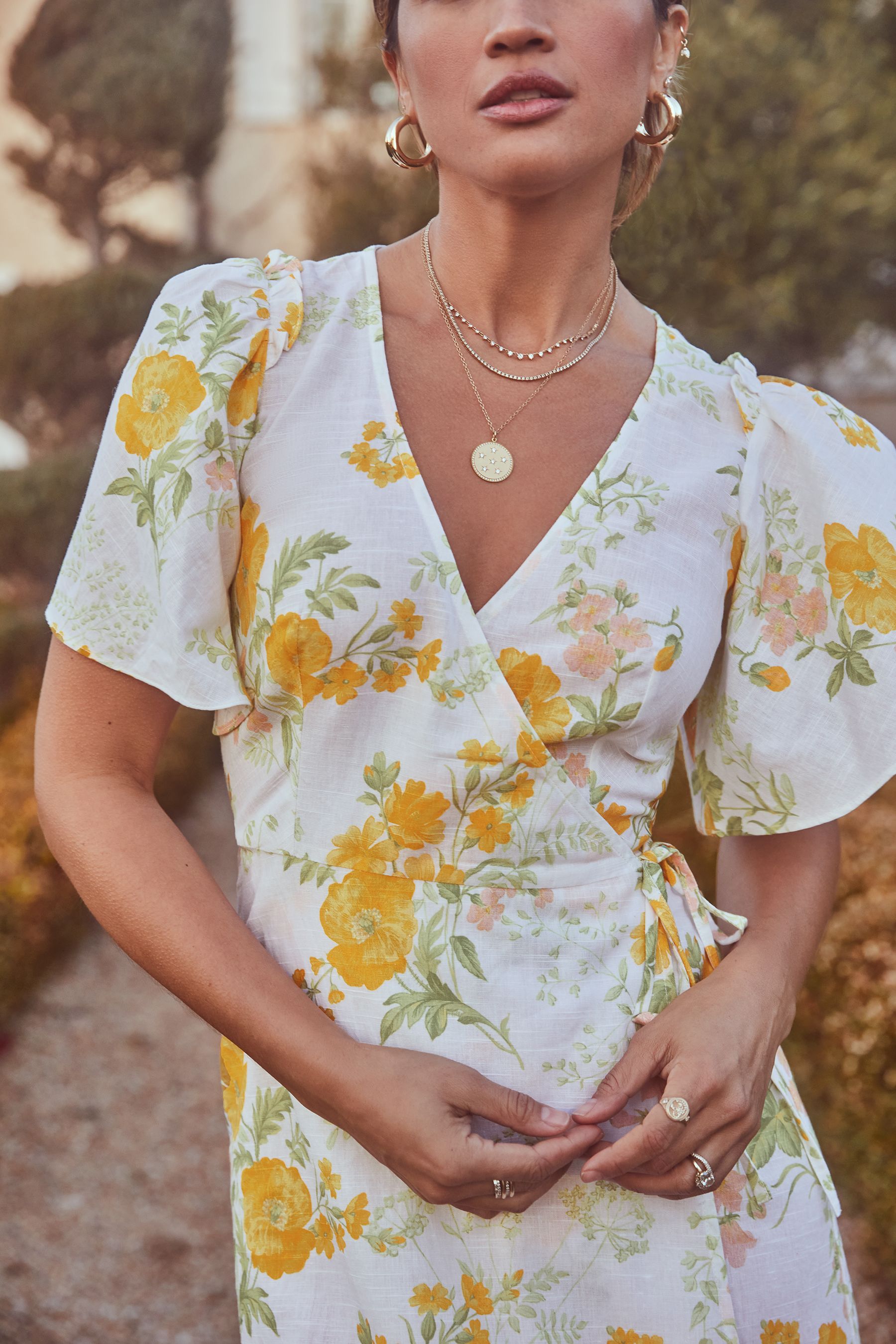 Buy Lipsy Yellow Floral V Neck Flutter Sleeve Wrap Waist Tie Midi Dress