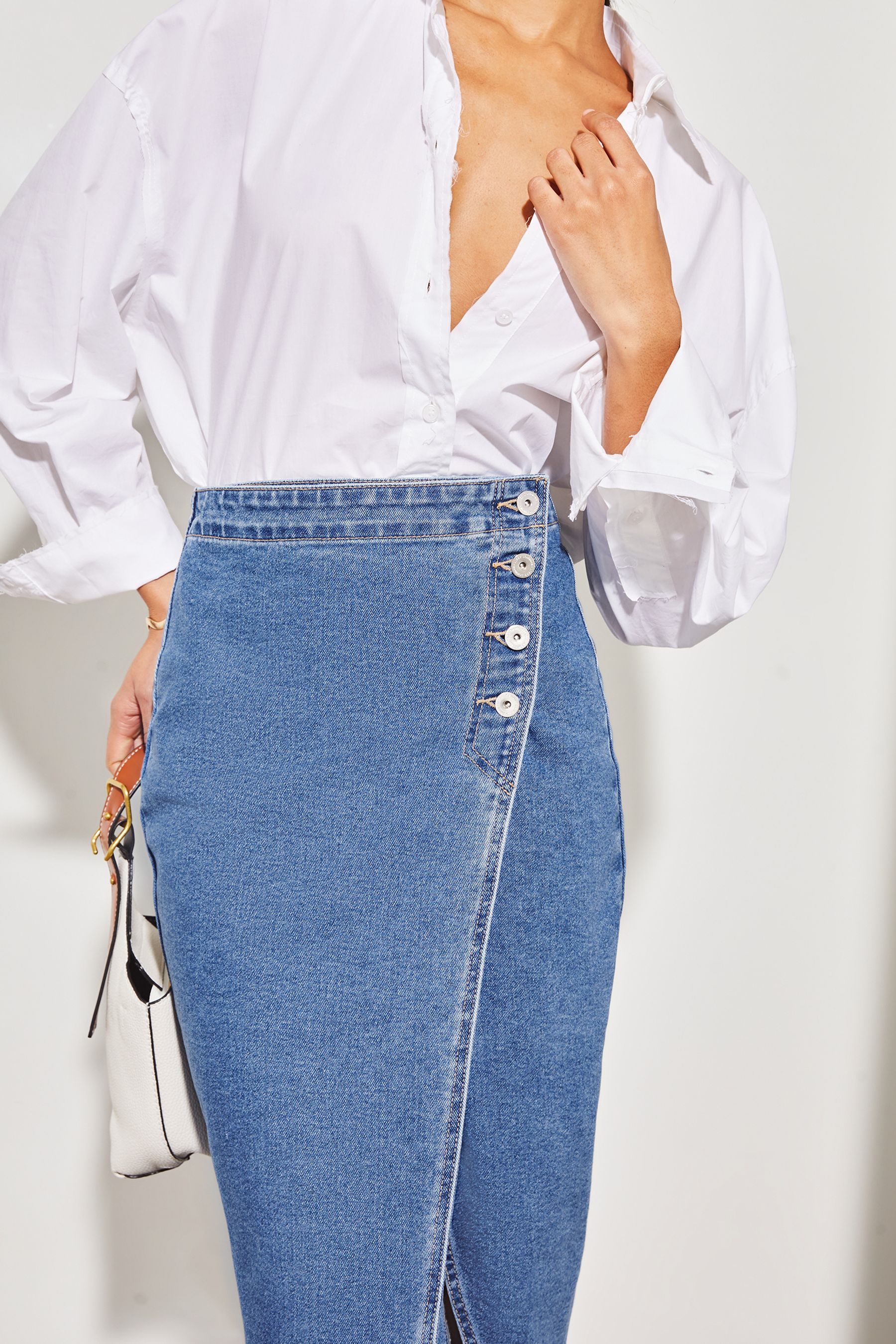Buy Lipsy Mid Wash Blue Denim Asymmetric Button Midi Skirt from Next ...