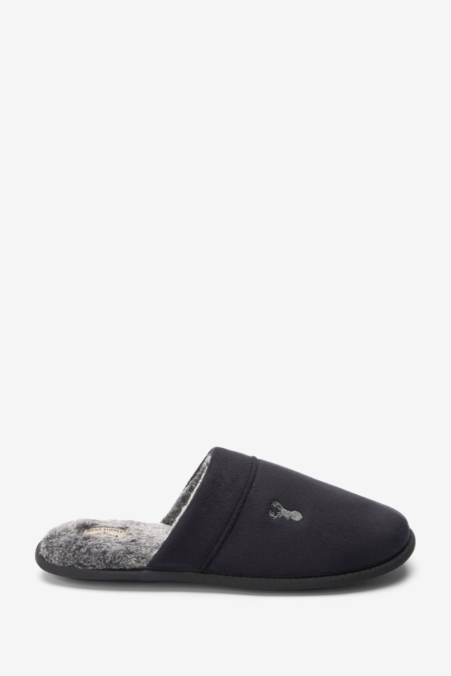 Buy Black Stag Faux Fur Lined Mule Slippers from the Next UK online shop