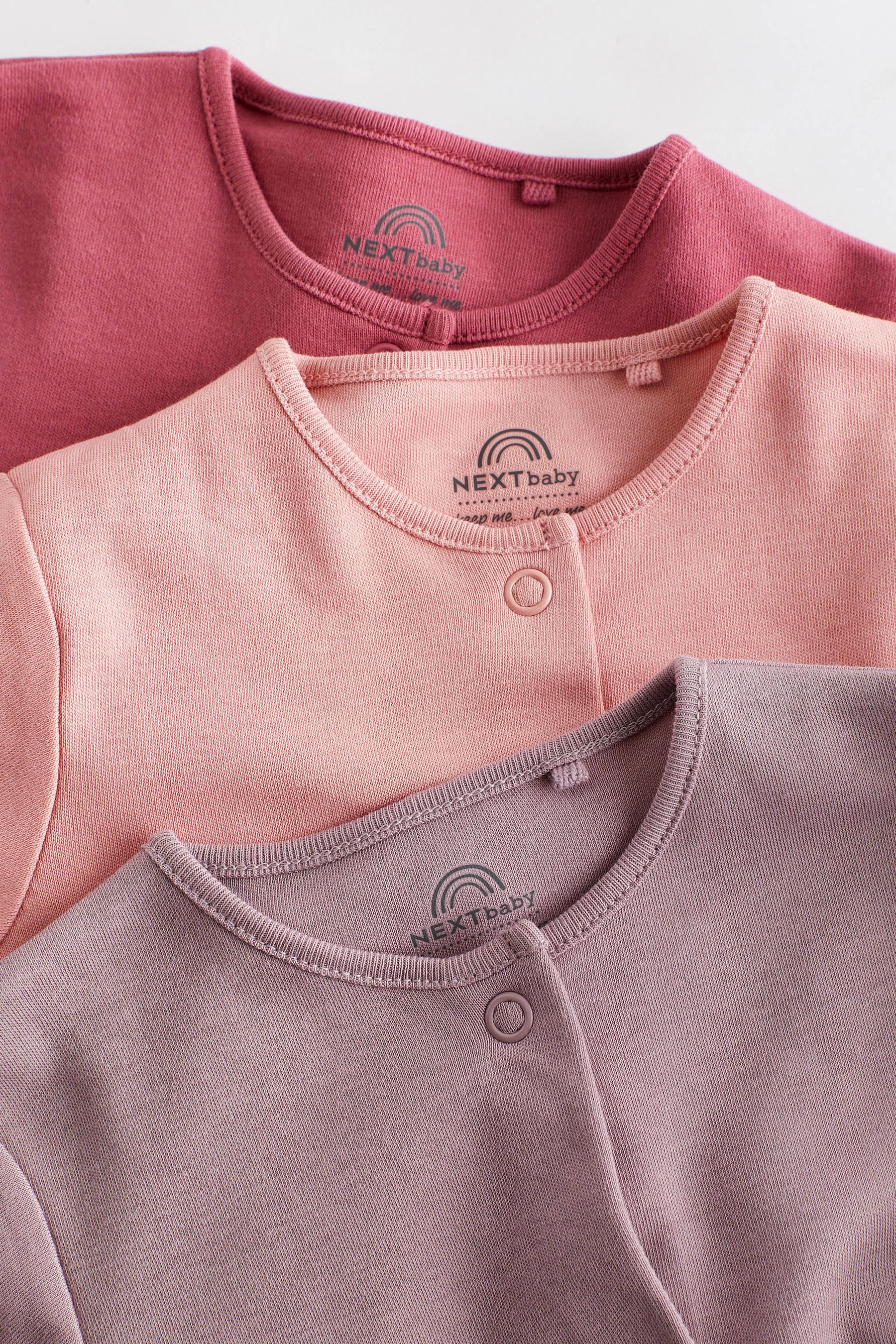 Buy Pink 3 Pack Cotton Baby Sleepsuits (0-2yrs) from Next United Arab ...