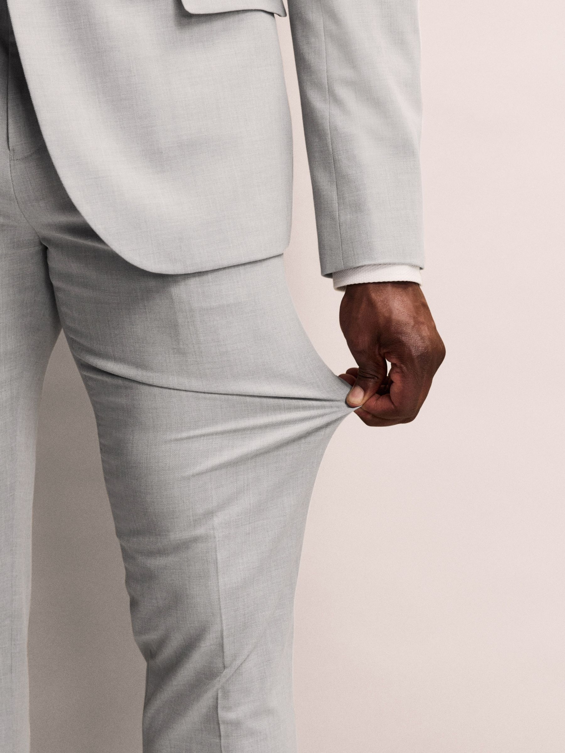 Buy Light Grey Muscle Fit Muscle FIt Motionflex Stretch Suit Trousers ...