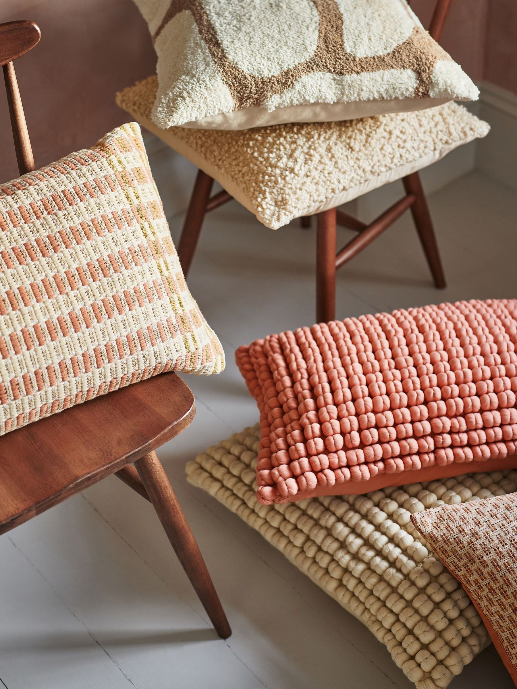 Buy Peach Pink 40 x 59cm Eva Textured Cushion from the Next UK online shop