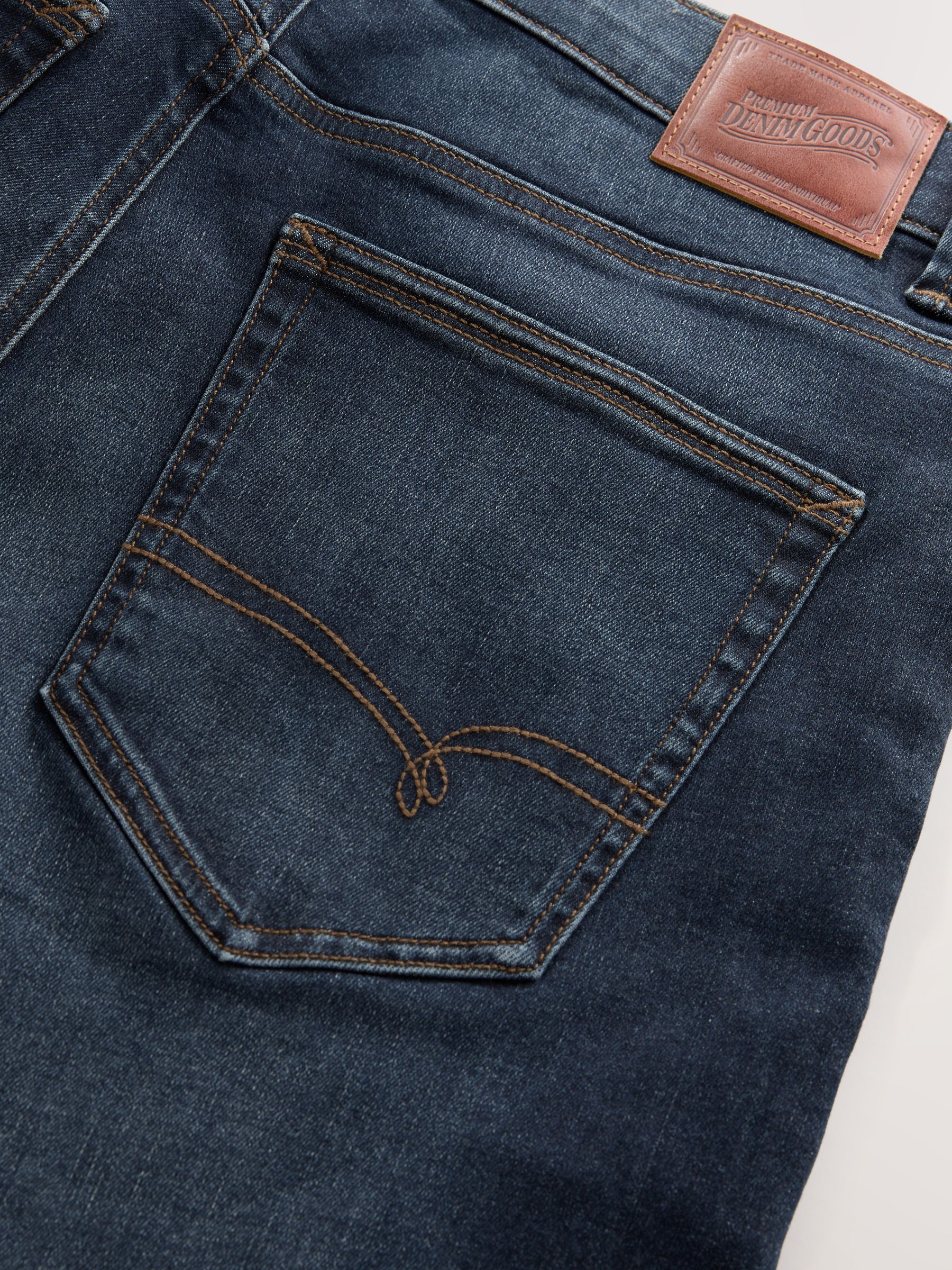 Buy Blue Mid Indigo Slim Fit Motionflex Jeans from the Next UK online shop