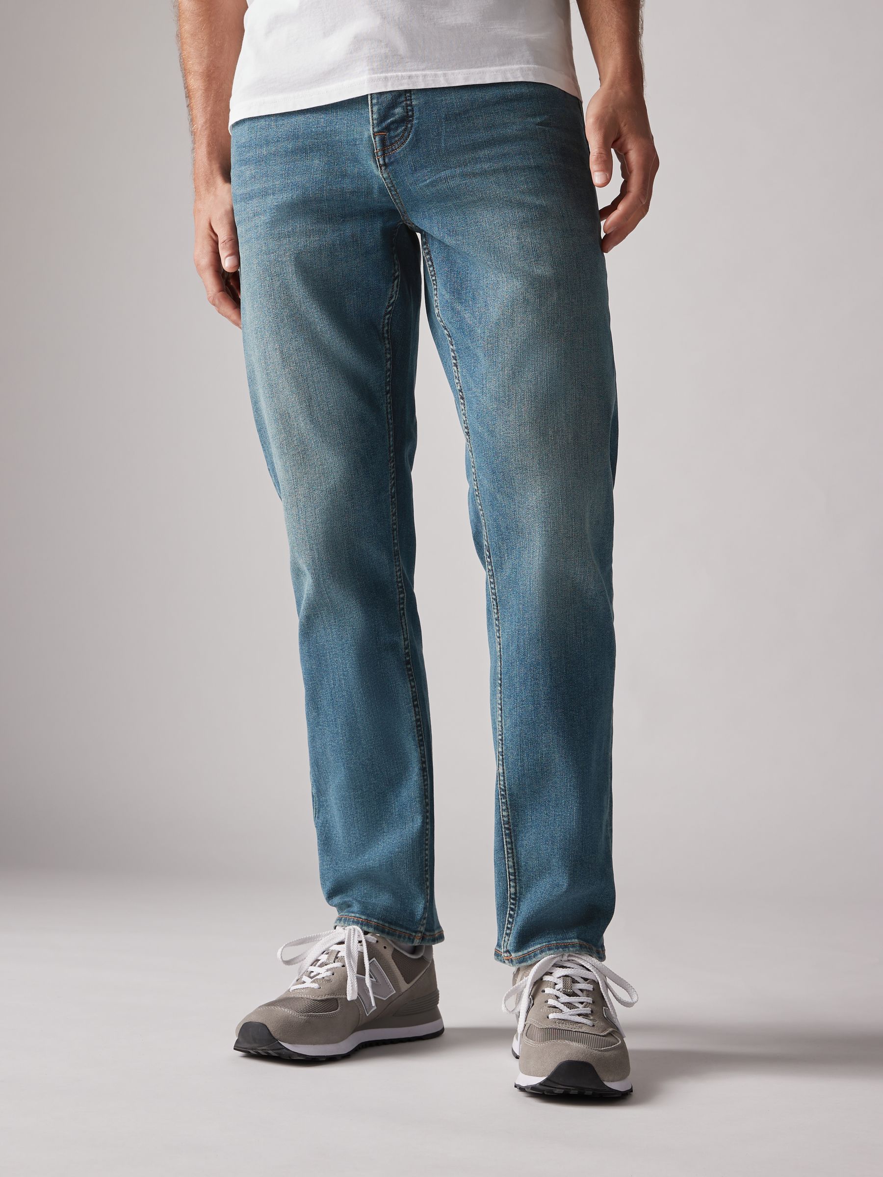 Buy Blue Mid Vintage Slim Fit Motionflex Jeans from Next Ireland