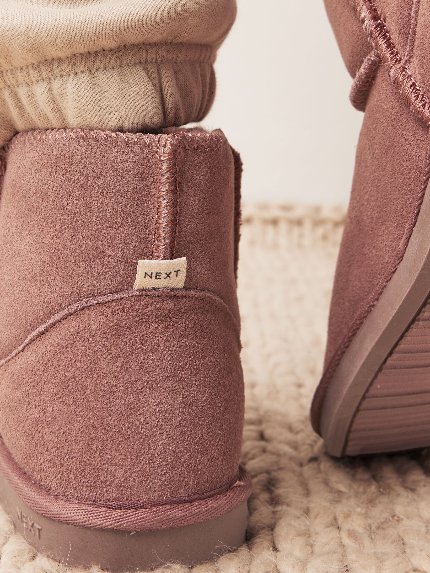 Buy Mink Pink Faux Fur Lined Suede Slipper Boots from the Next UK ...