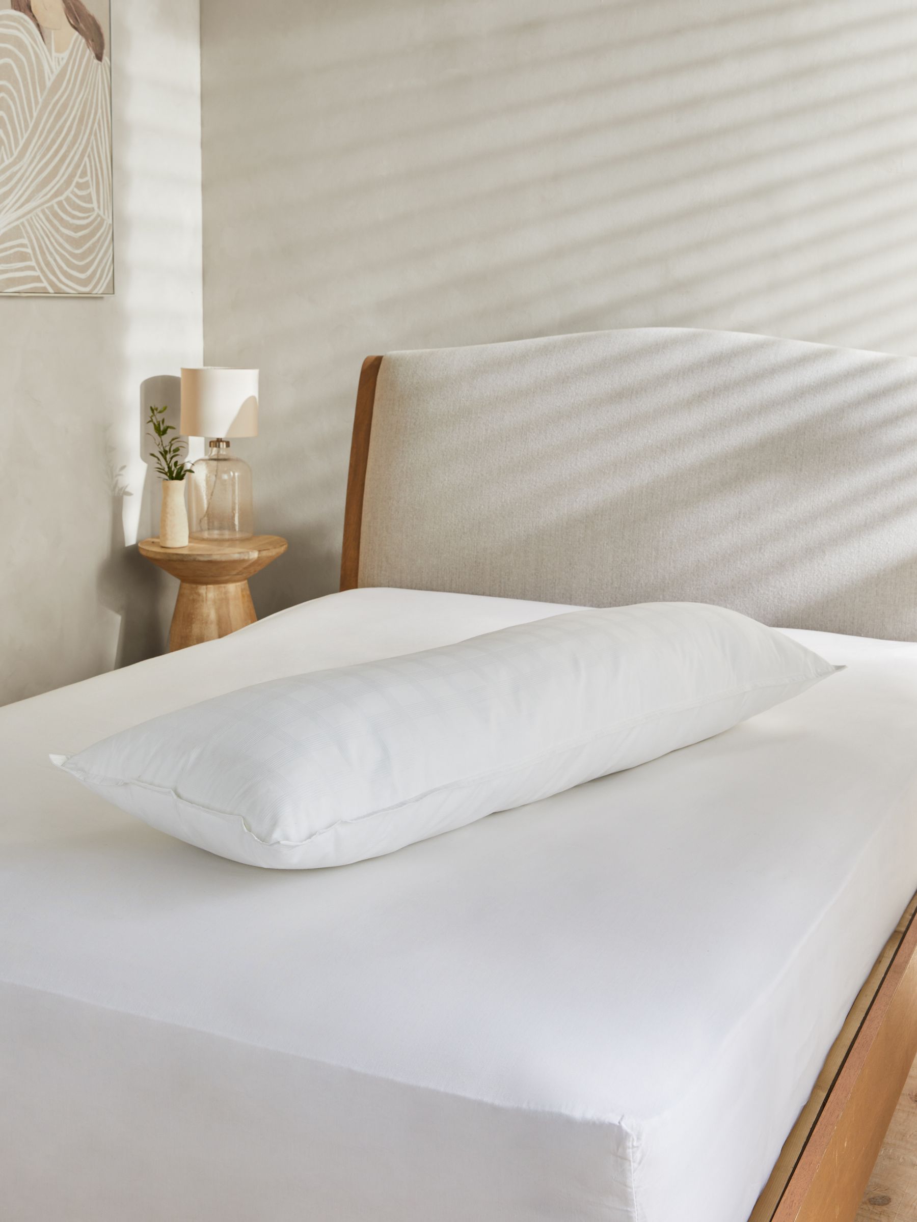 Buy Large Bolster Feels Like Down Pillow from the Next UK online shop