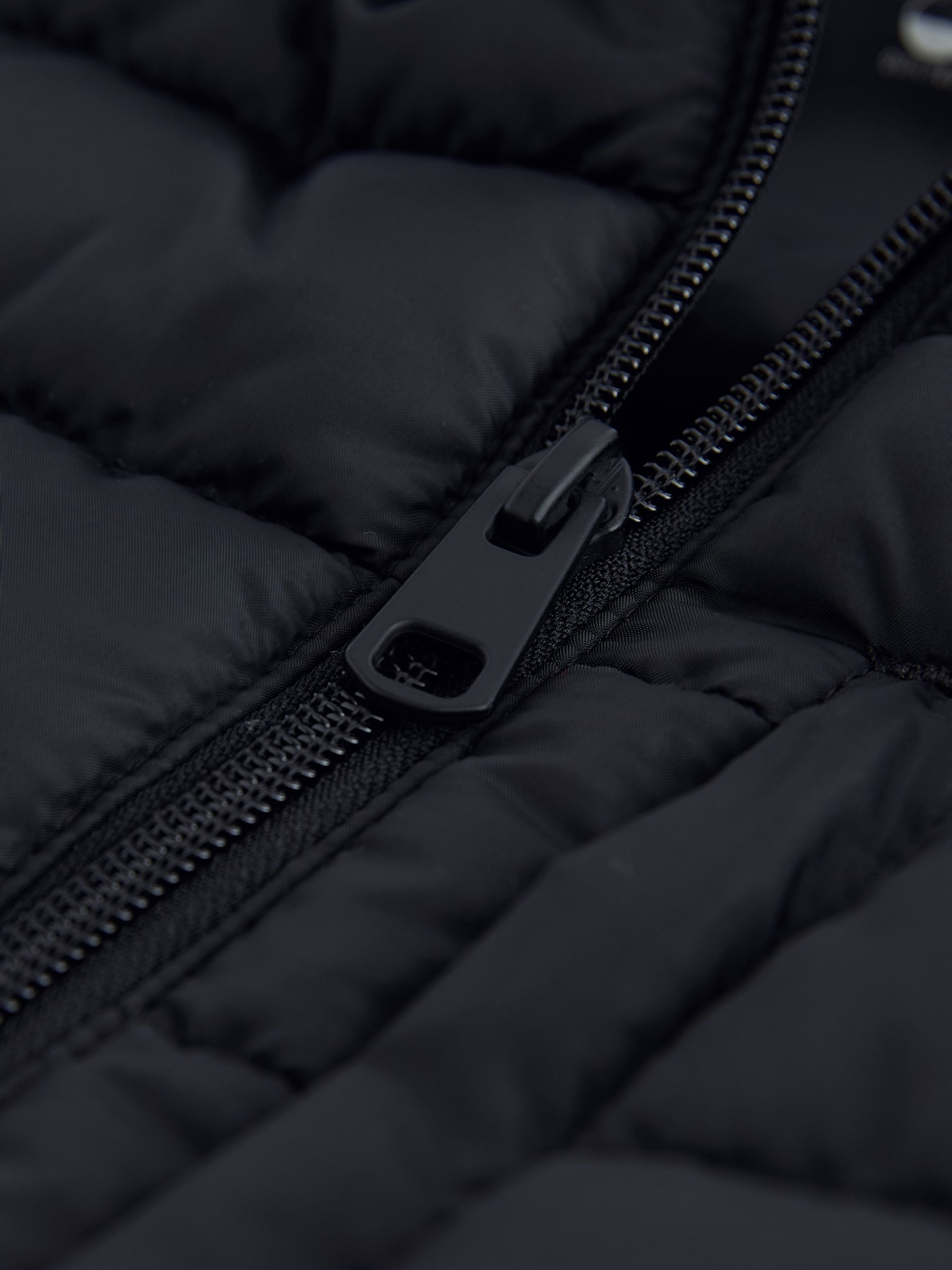 Buy Black Shower Resistant Lightweight Puffer Gilet from the Next UK online shop