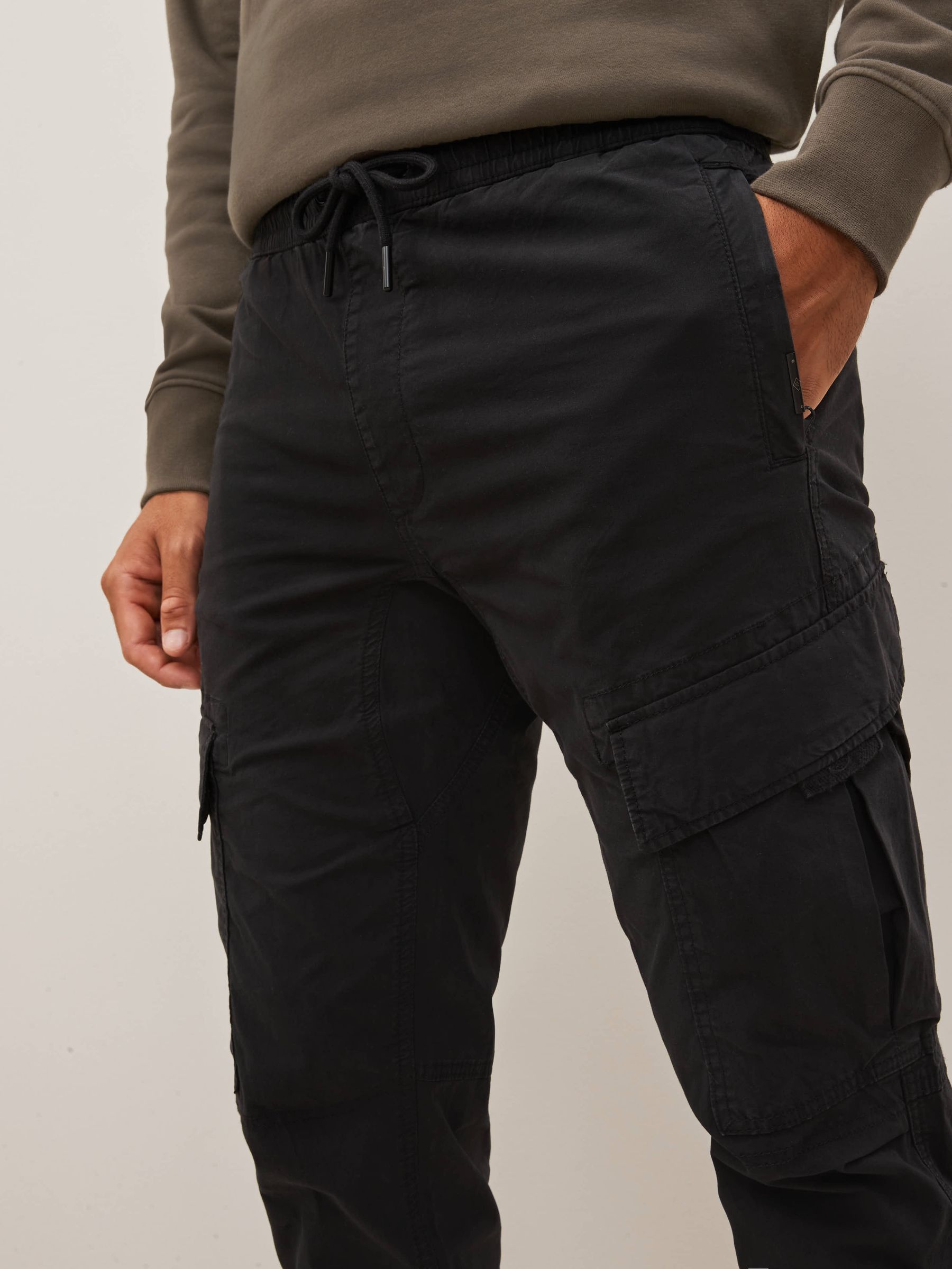 Buy Black Slim Fit Stretch Utility Cargo Trousers from the Next UK ...