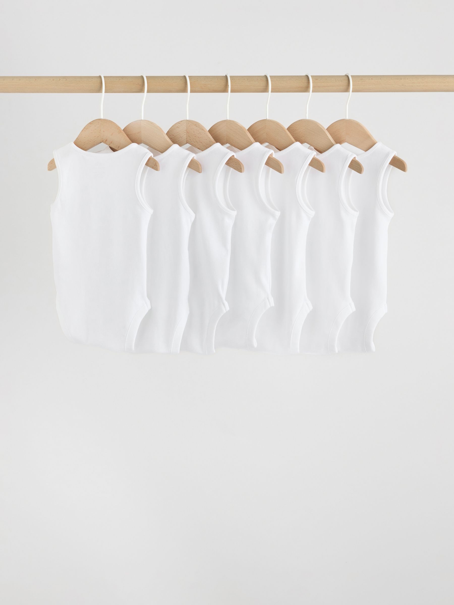 Buy White 7 Pack Baby Vest Bodysuits from the Next UK online shop