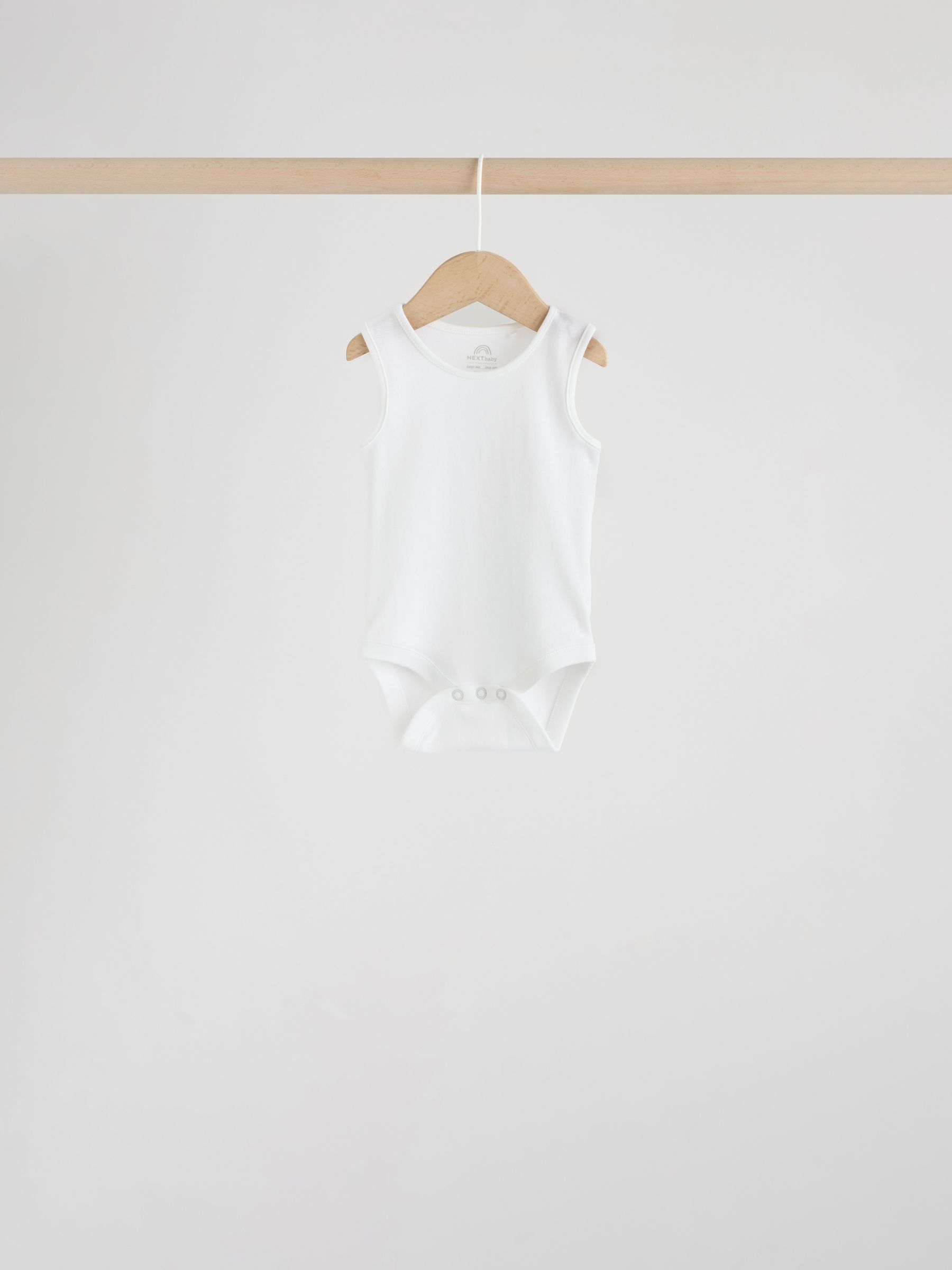 Buy White 7 Pack Baby Vest Bodysuits from the Next UK online shop