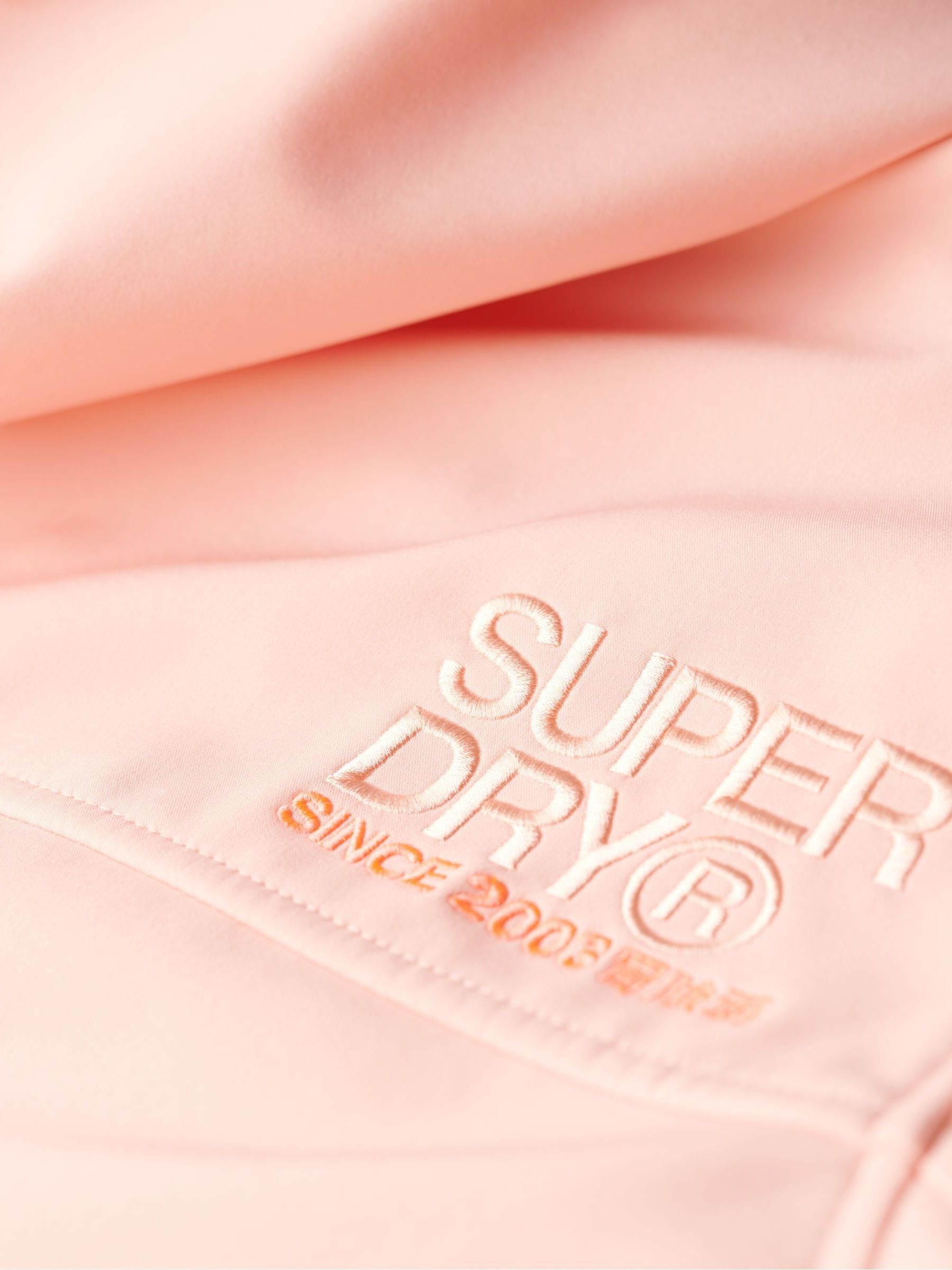 Buy Superdry Peach Pearl Pink Hooded Soft Shell Trekker Jacket from the ...