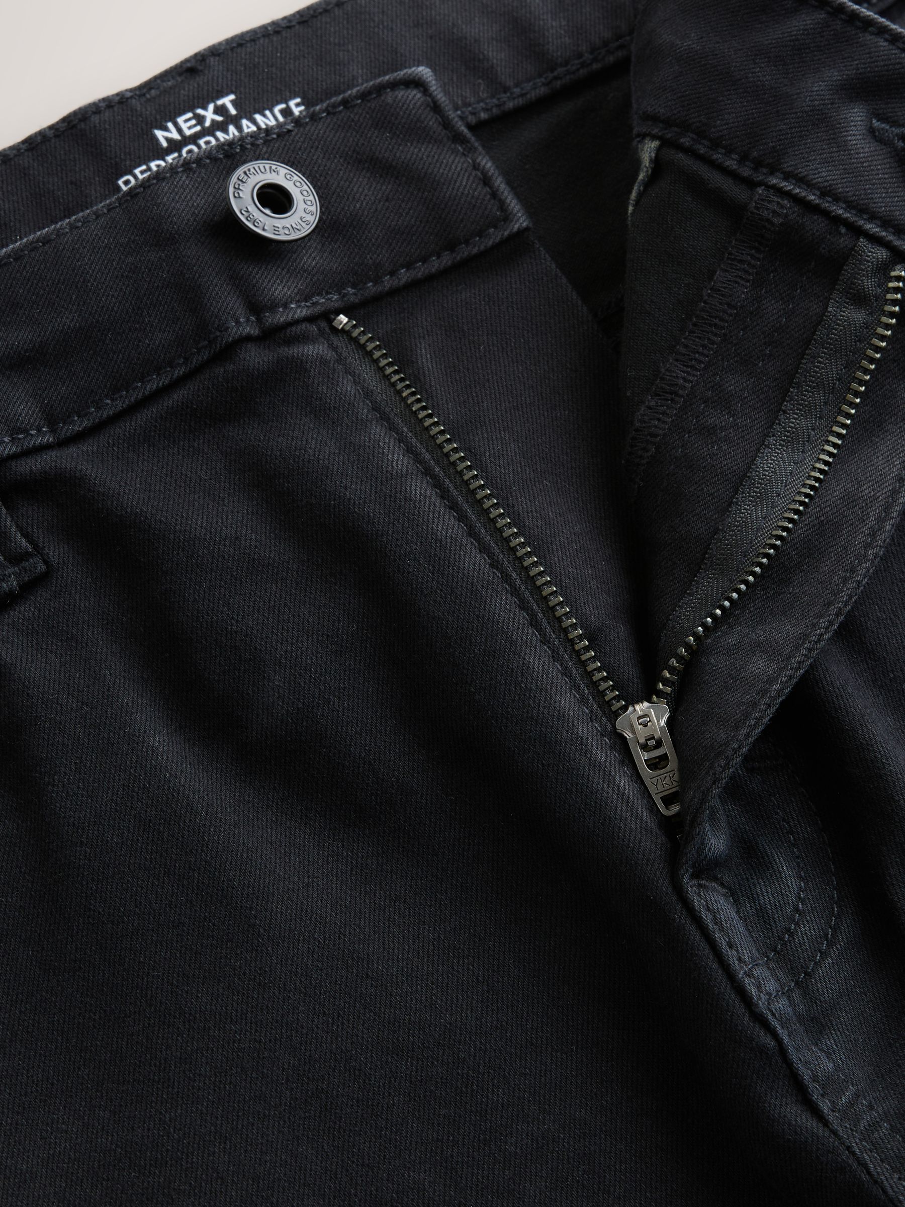 Buy Black Straight Fit Motionflex Jeans from the Next UK online shop