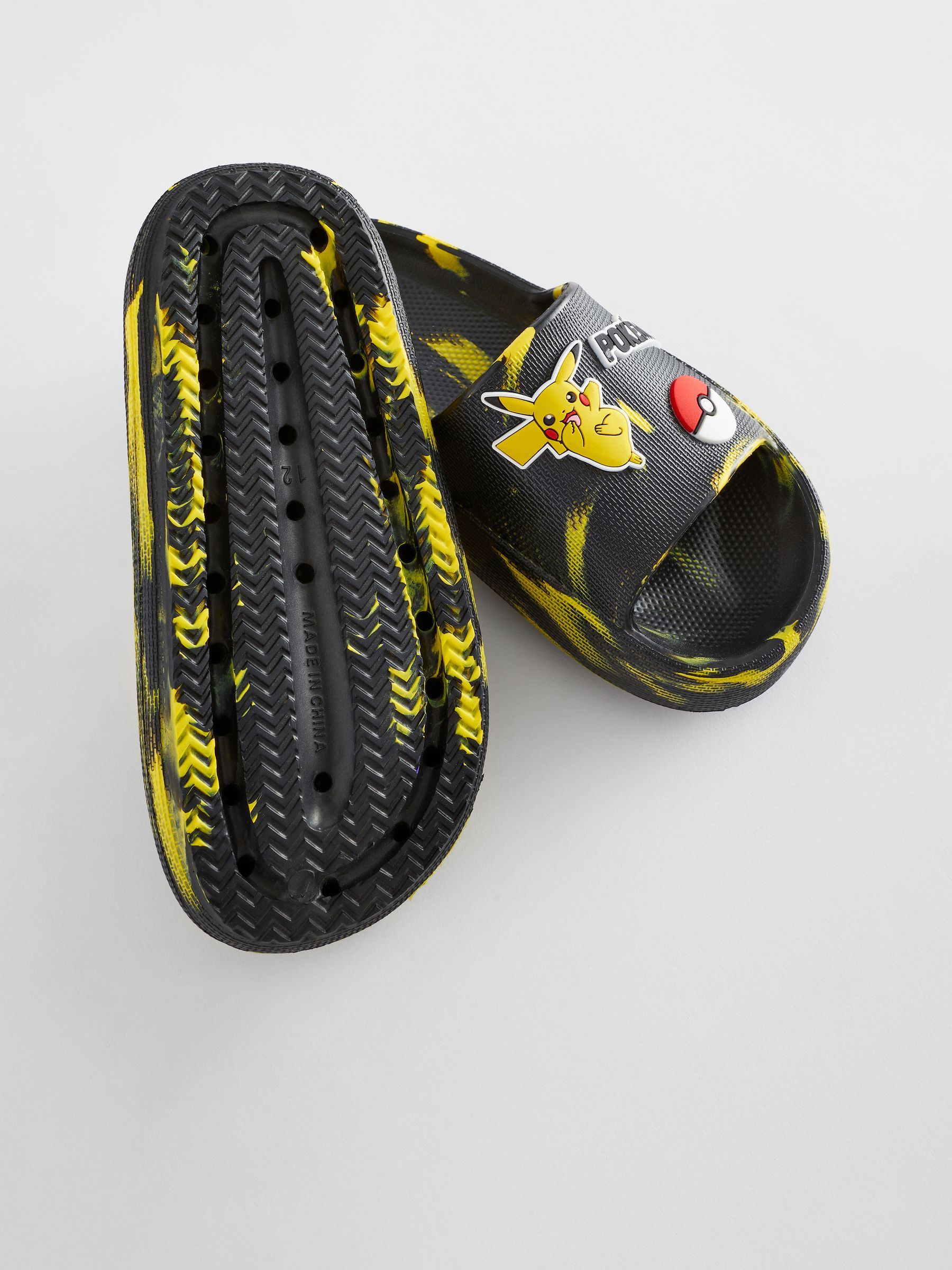 Buy Yellow/Black Pokémon Chunky Sliders from the Next UK online shop