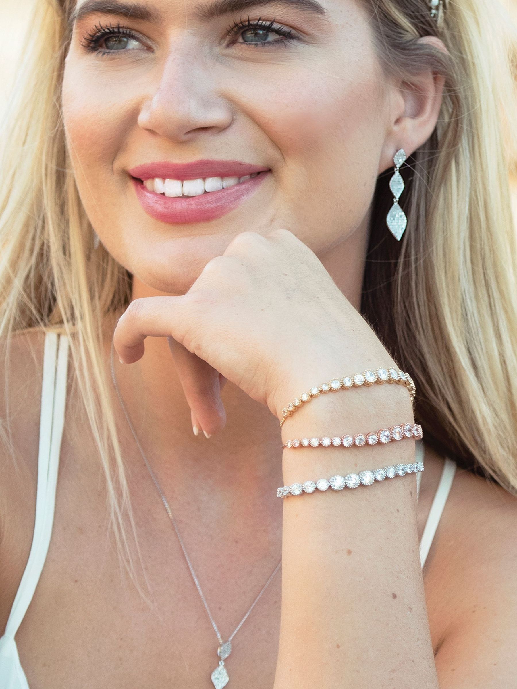 Buy Ivory & Co Rhodium Rochelle Crystal Pave Triple Drop Earrings from ...