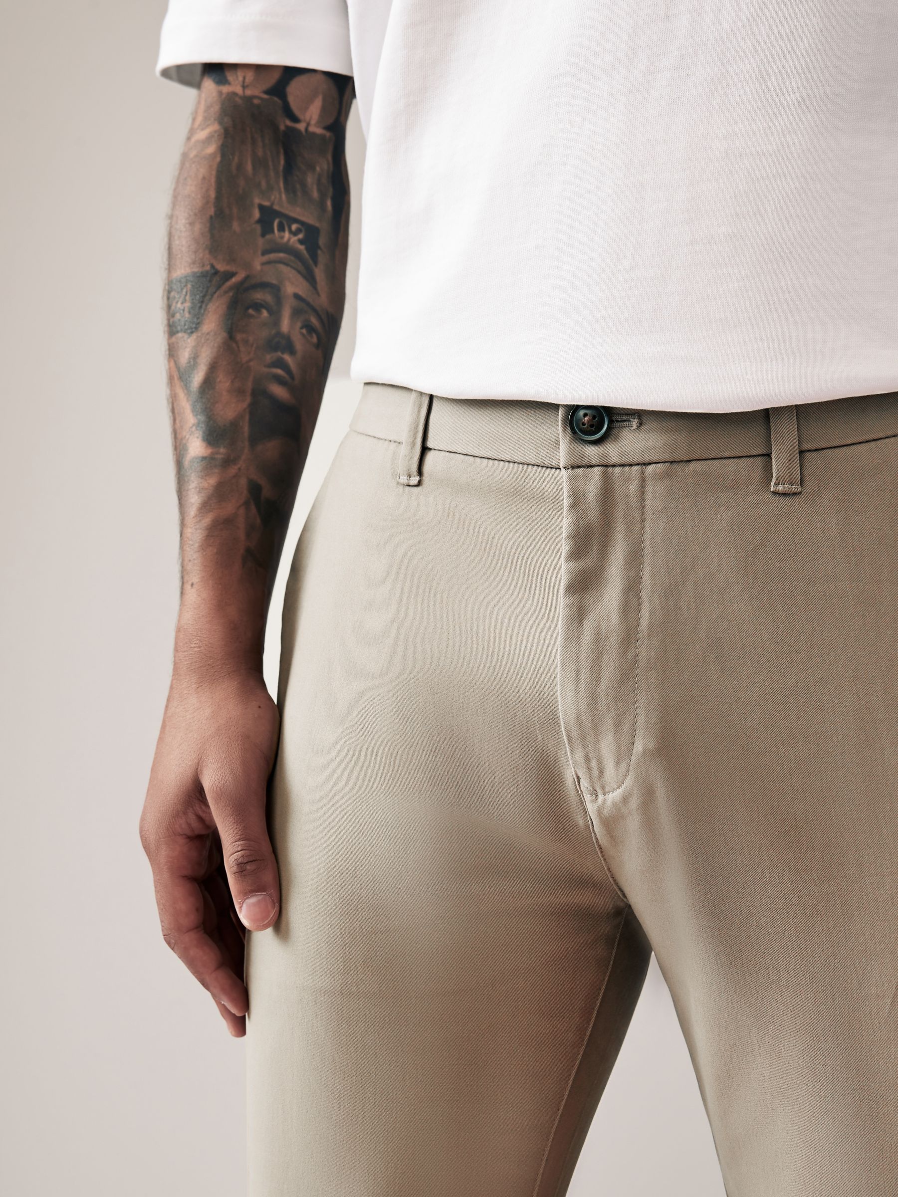 Buy Stone Slim Fit Stretch Chinos Trousers from Next Saudi Arabia