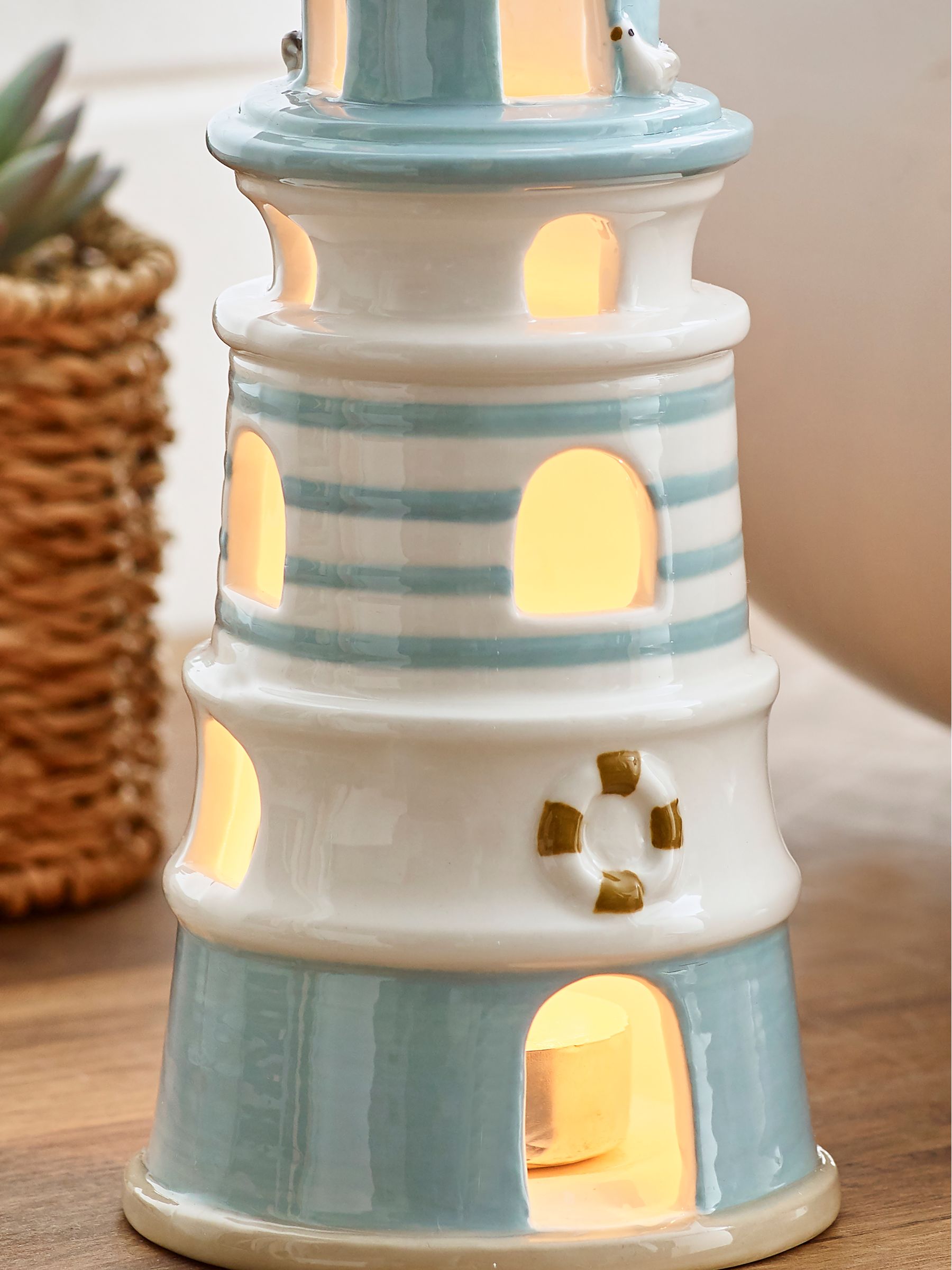 Buy Blue Seaside Lighthouse Tealight Holder from the Next UK online shop