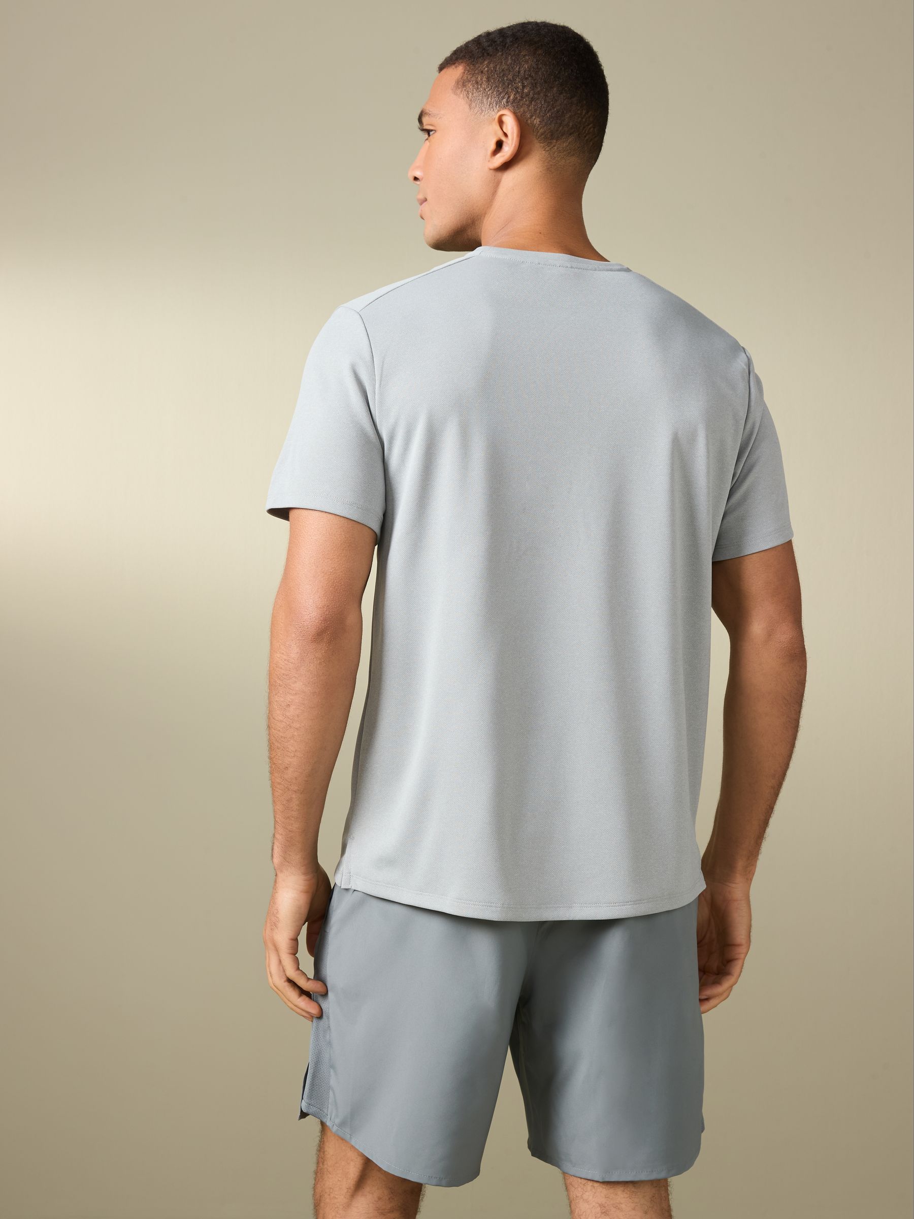 Buy Nike Light Grey Dri-FIT Miler Running T-Shirt from the Next UK ...