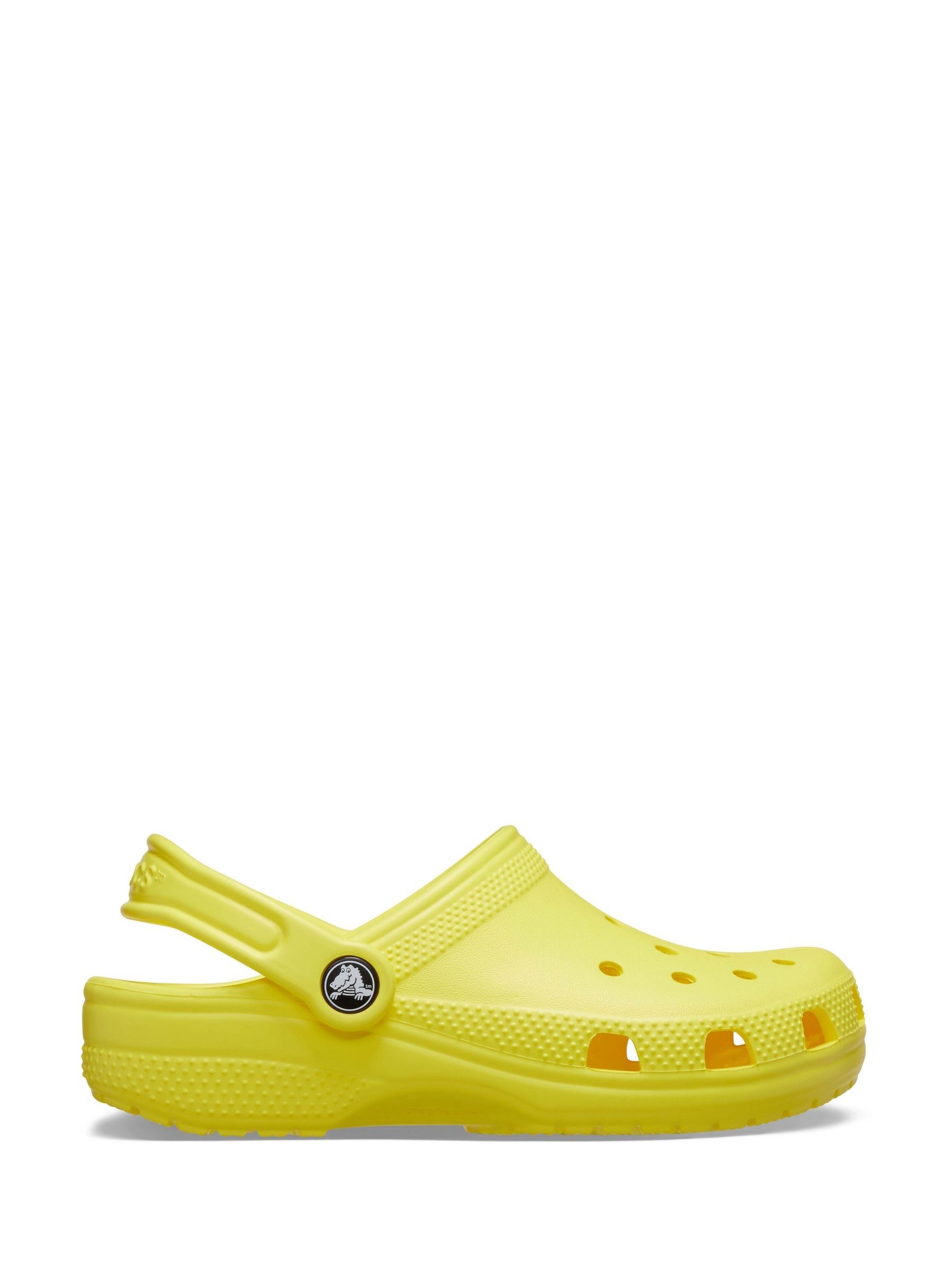 Buy Crocs Cyber Yellow Kids Unisex Classic Clogs from the Next UK ...